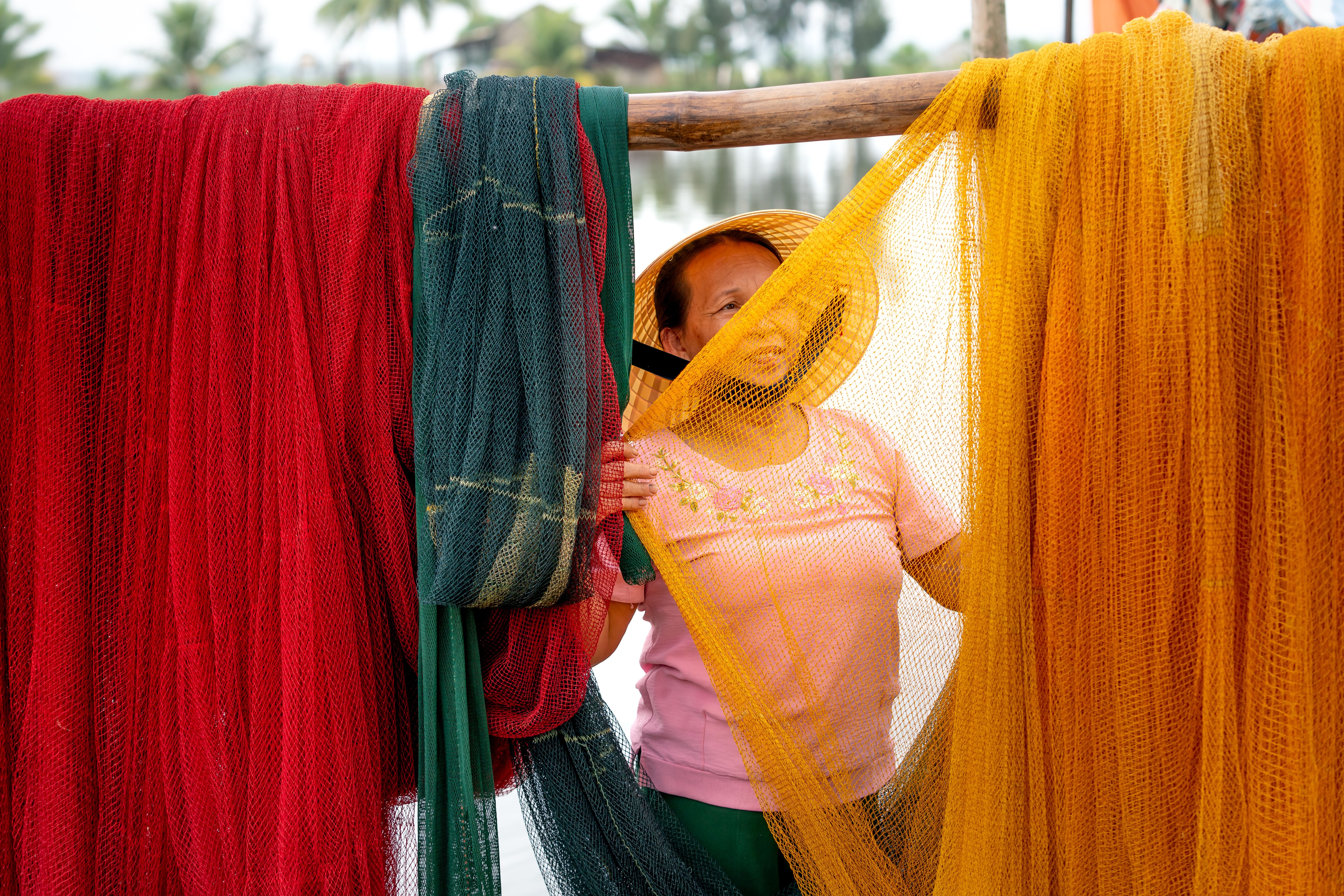 Woman Hanging Up Fishing Nets · Free Stock Photo
