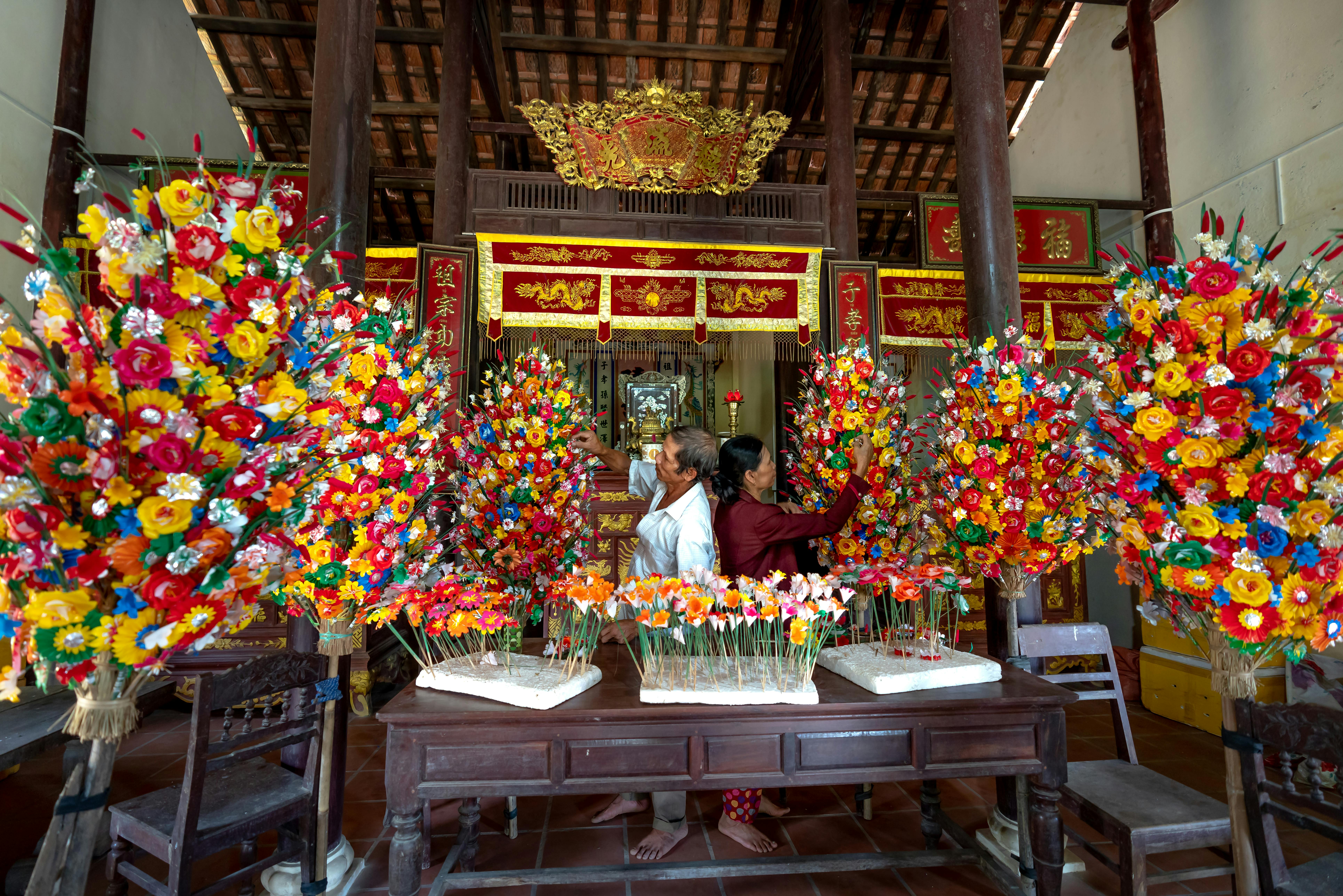 Women Standing at a Festival Stall · Free Stock Photo