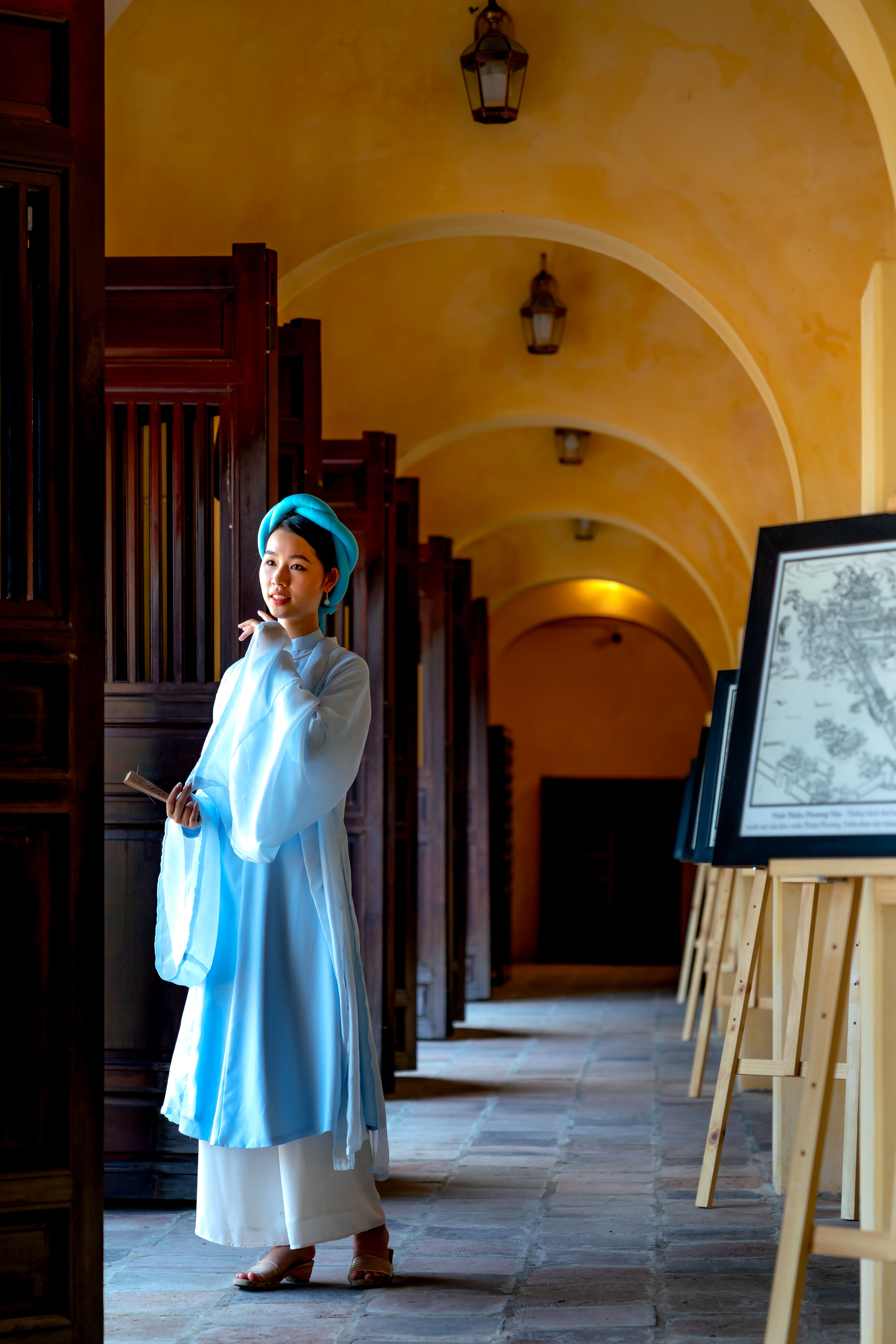 Woman in Traditional Malay Clothes Standing on a Paved Walkway · Free ...