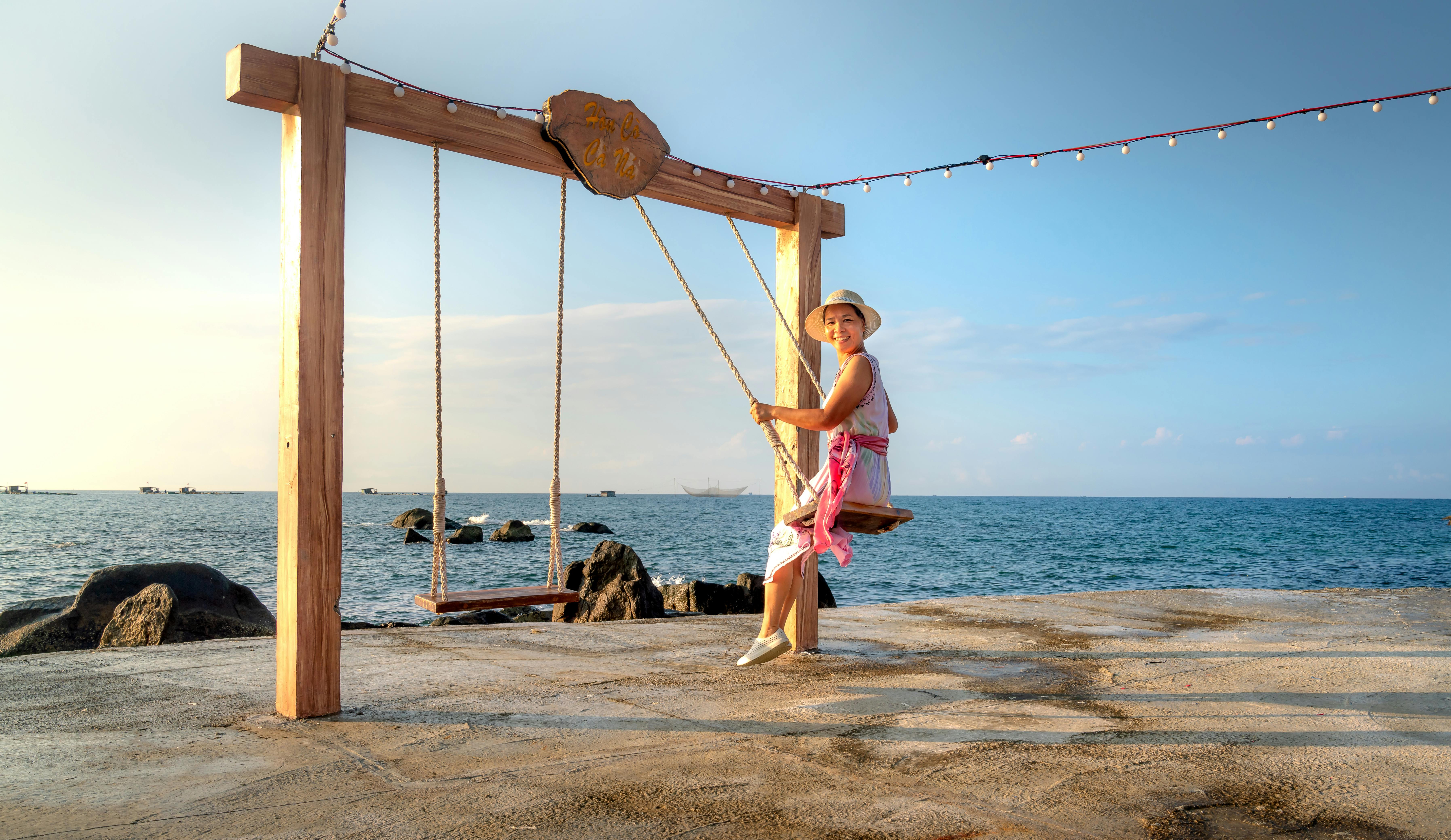 Woman On Swing Near Ocean Photos, Download The BEST Free Woman On Swing ...