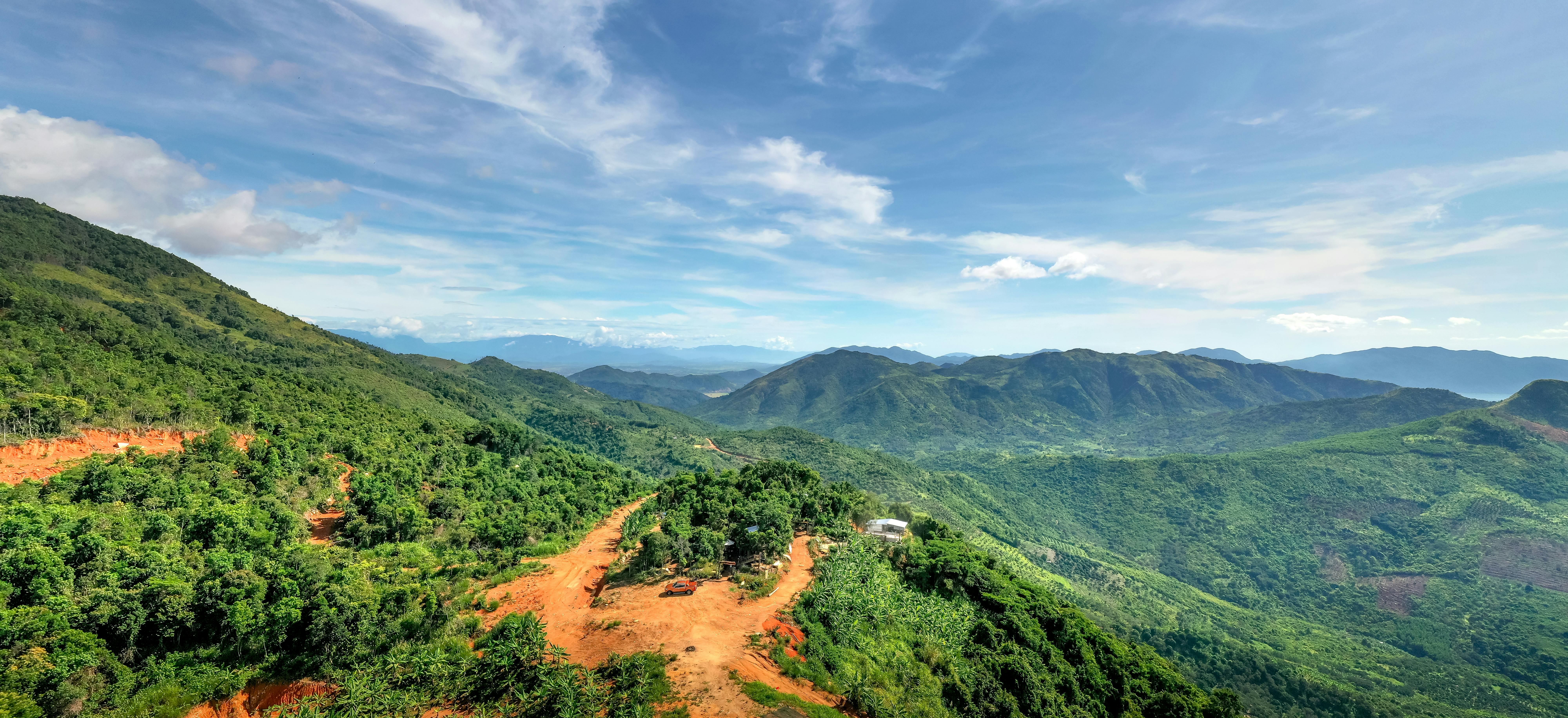 Beautiful Green Mountains Under Blue Sky · Free Stock Photo