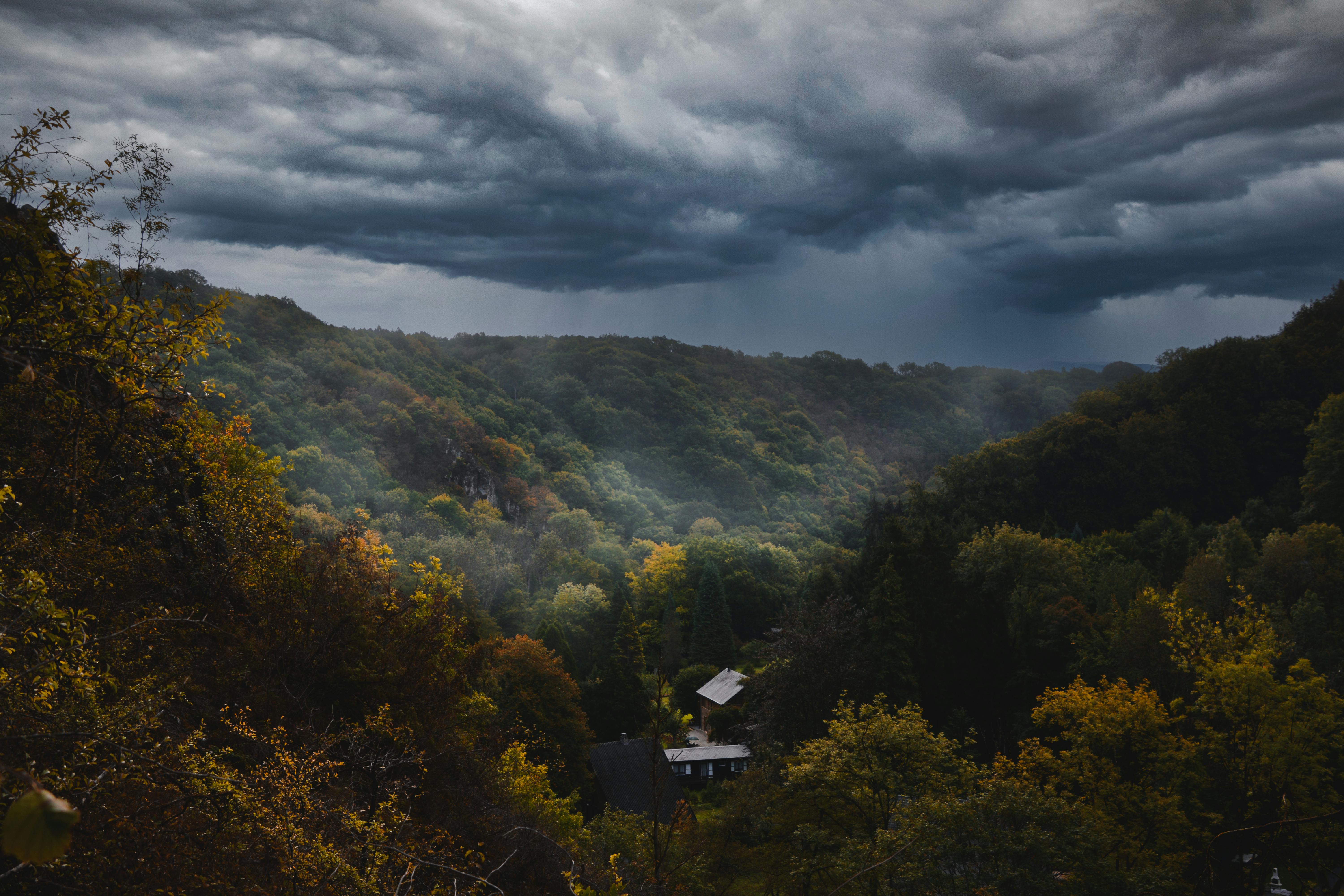 House in Valley on Rainy Day · Free Stock Photo