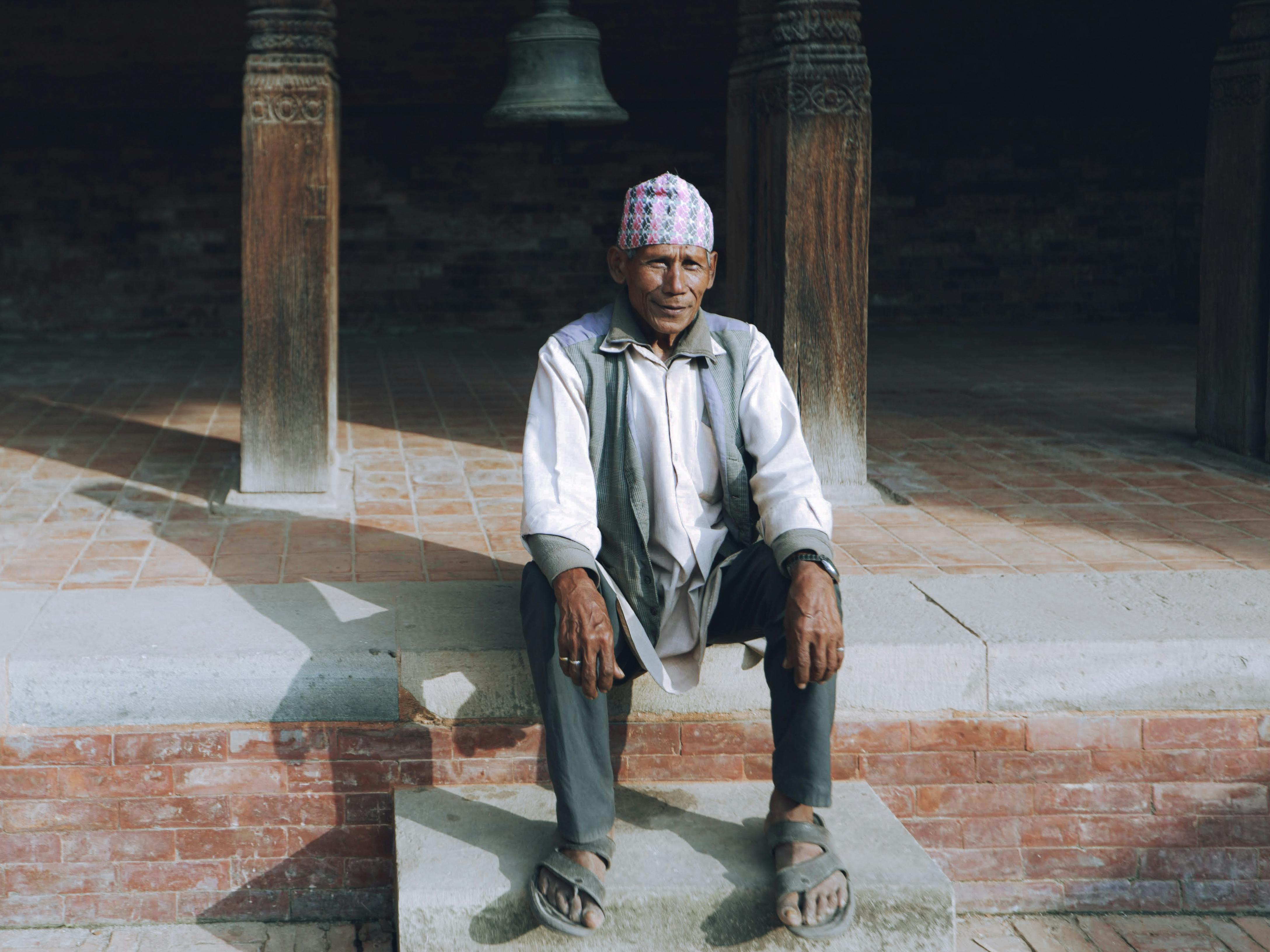 Sitting Man Drawing a Portrait · Free Stock Photo