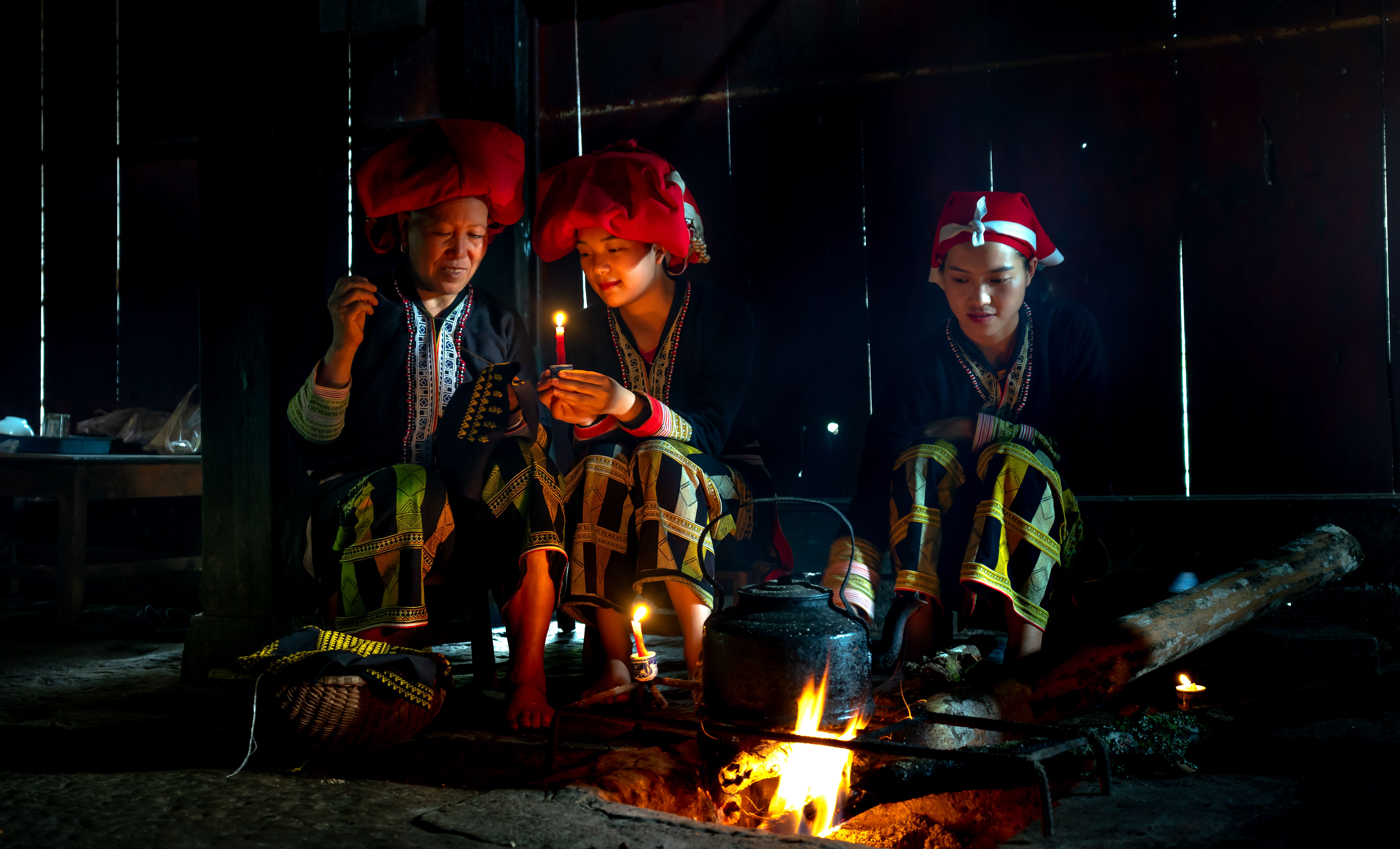 Red Dao Hill Tribe Women Sitting around Burning Fire · Free Stock Photo