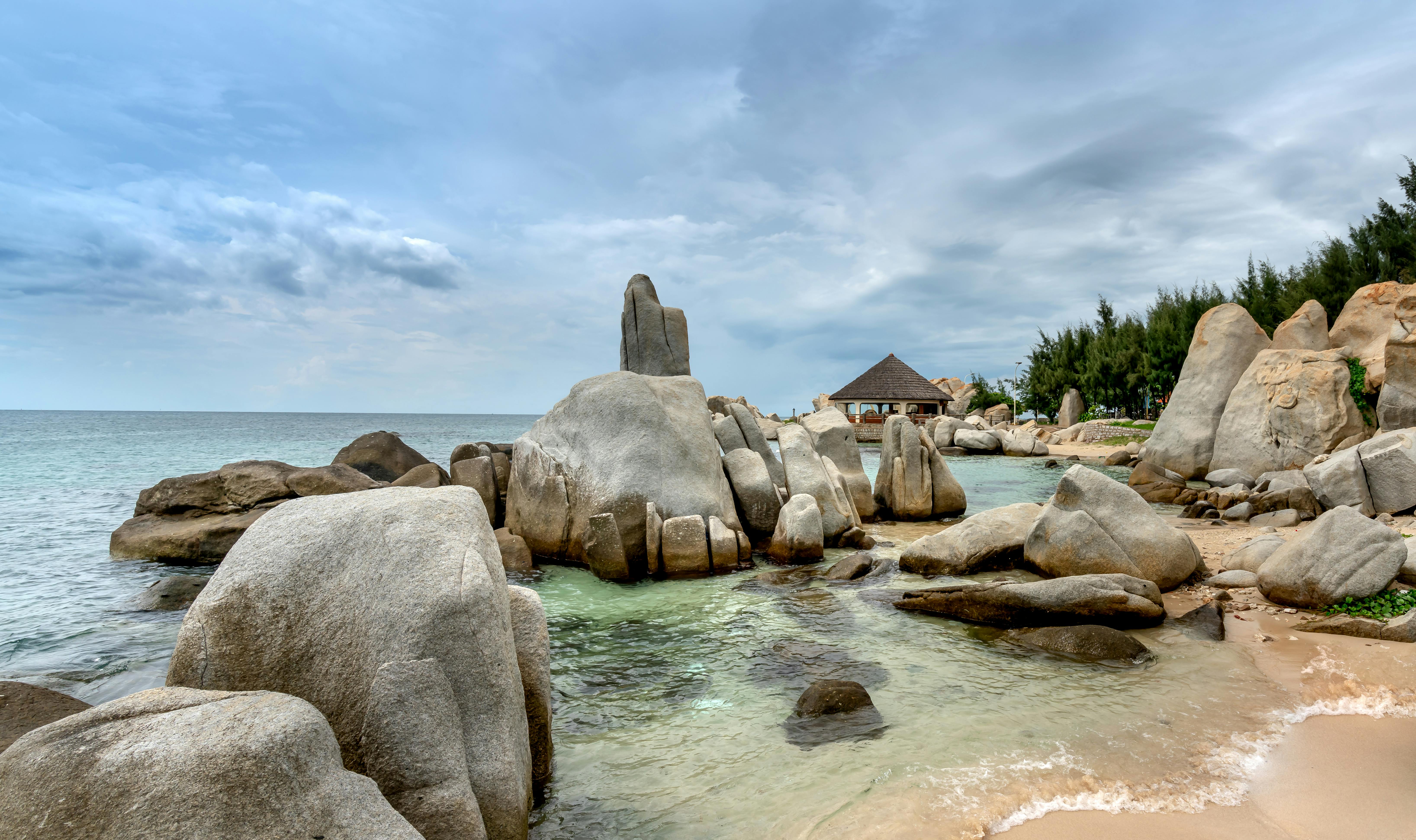 Rocks on a Sandy Beach · Free Stock Photo