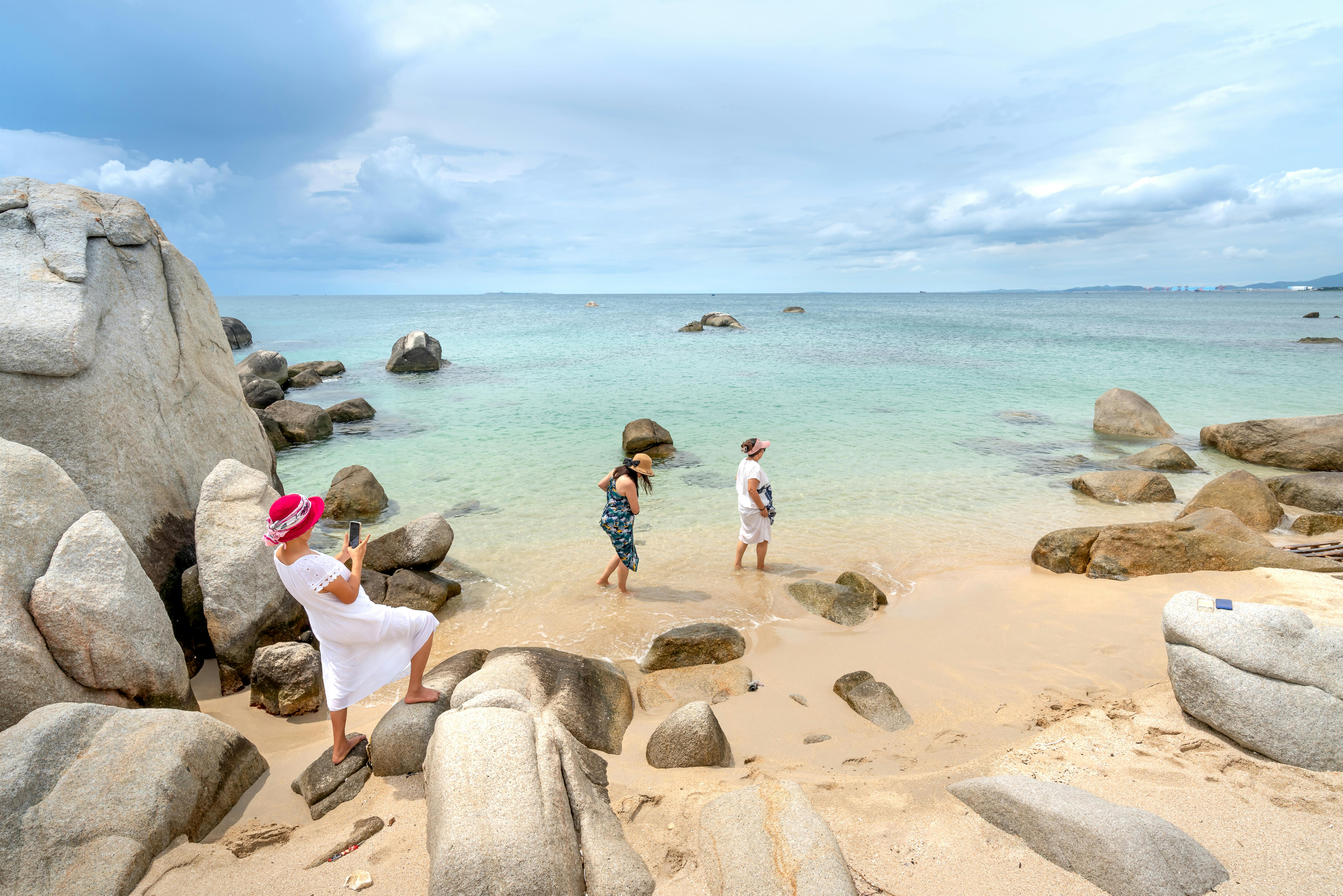 Women on Rocky Beach · Free Stock Photo