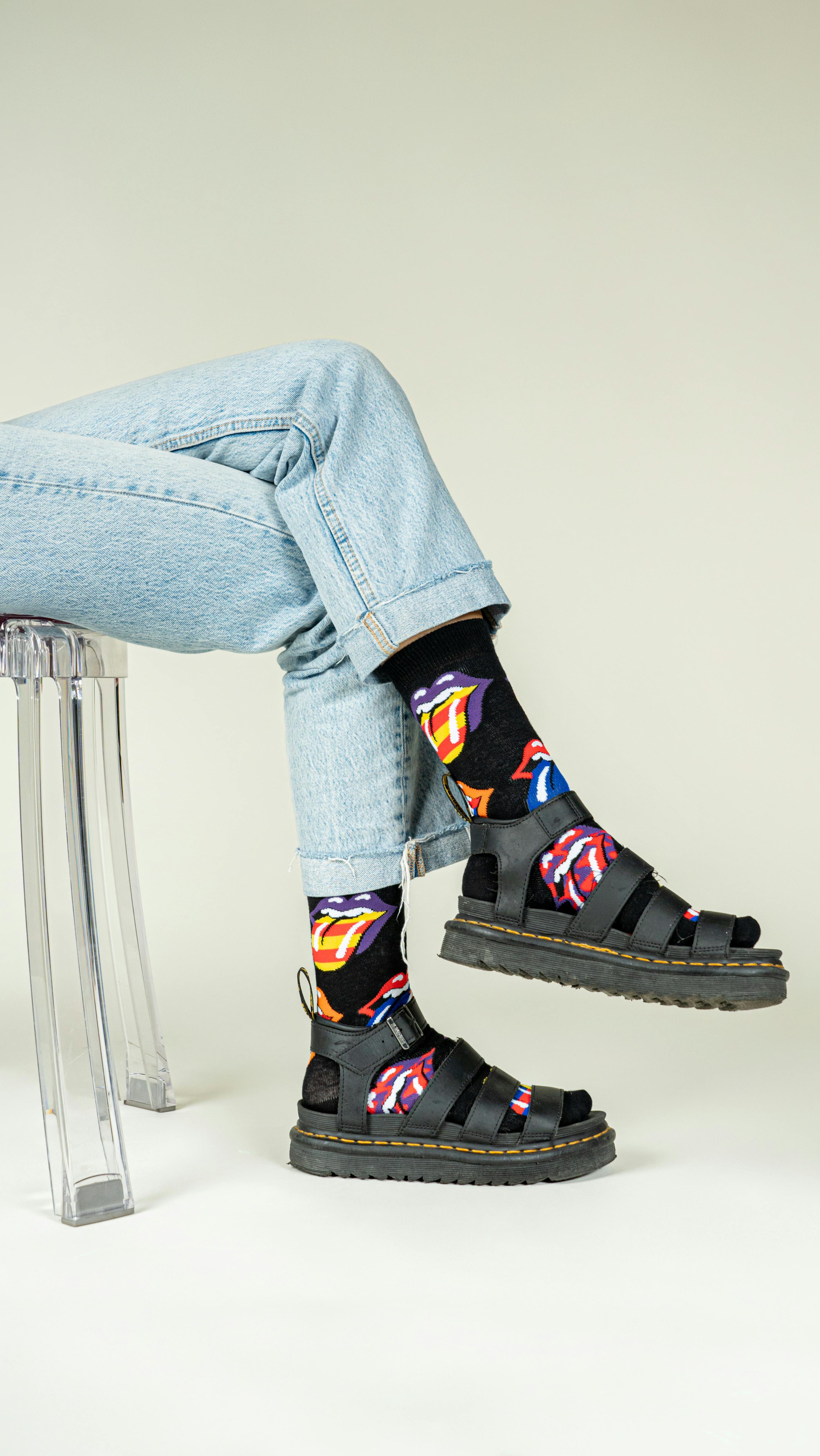 Legs of a Girl Wearing Jeans, Socks and Sandals · Free Stock Photo