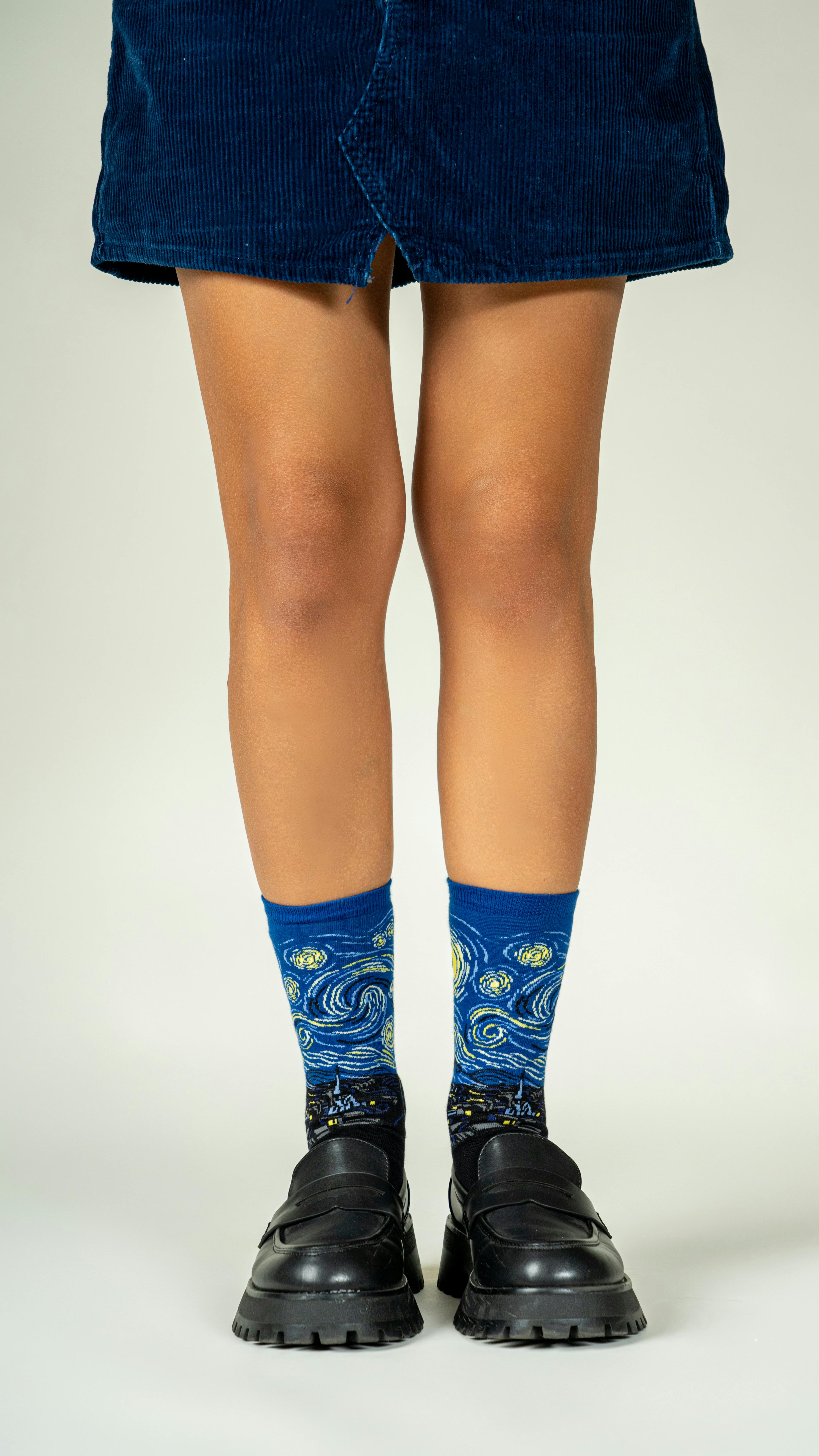 Portrait of woman pulling sock · Free Stock Photo