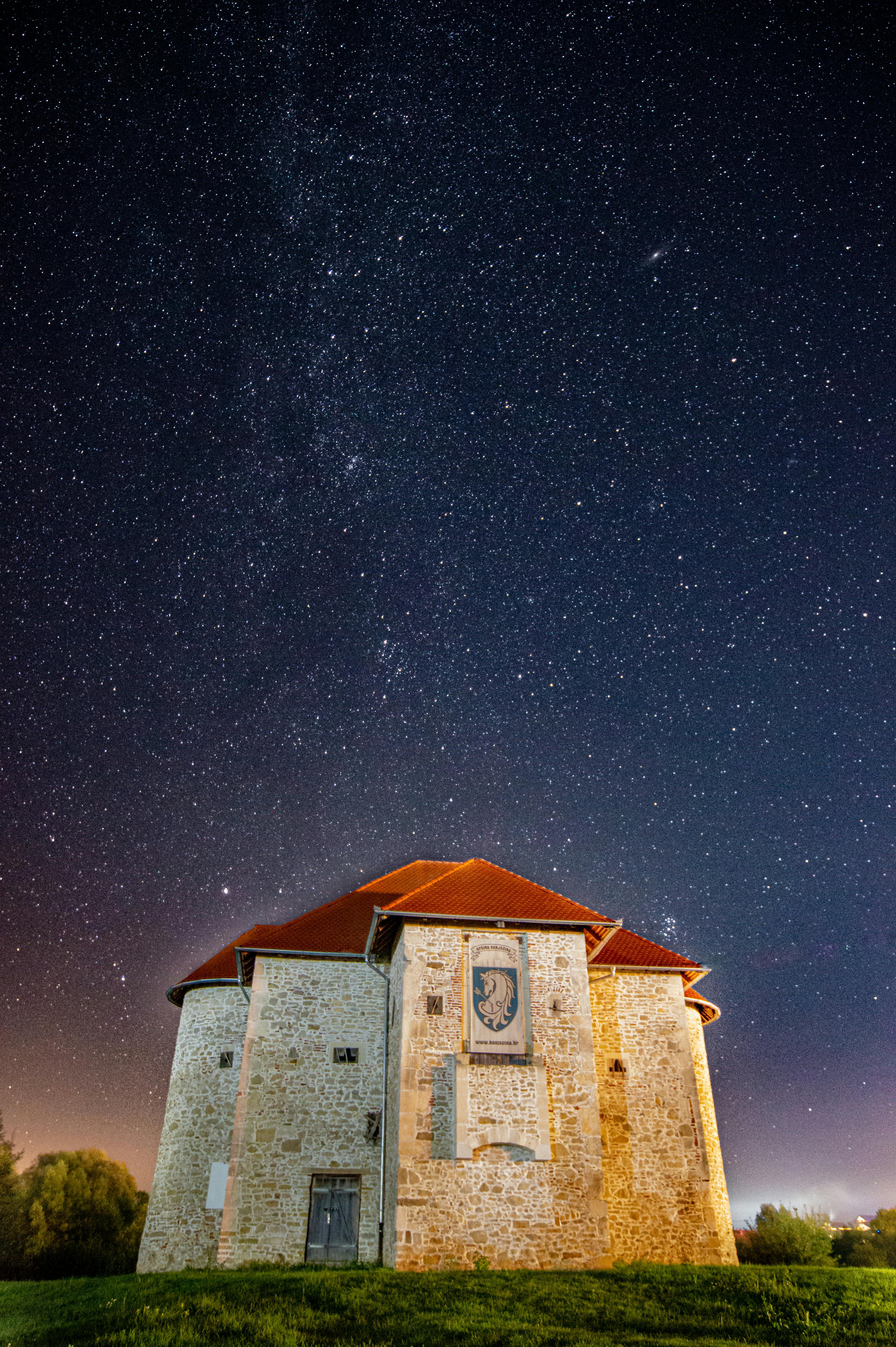 Brick Building against Starry Night Sky · Free Stock Photo