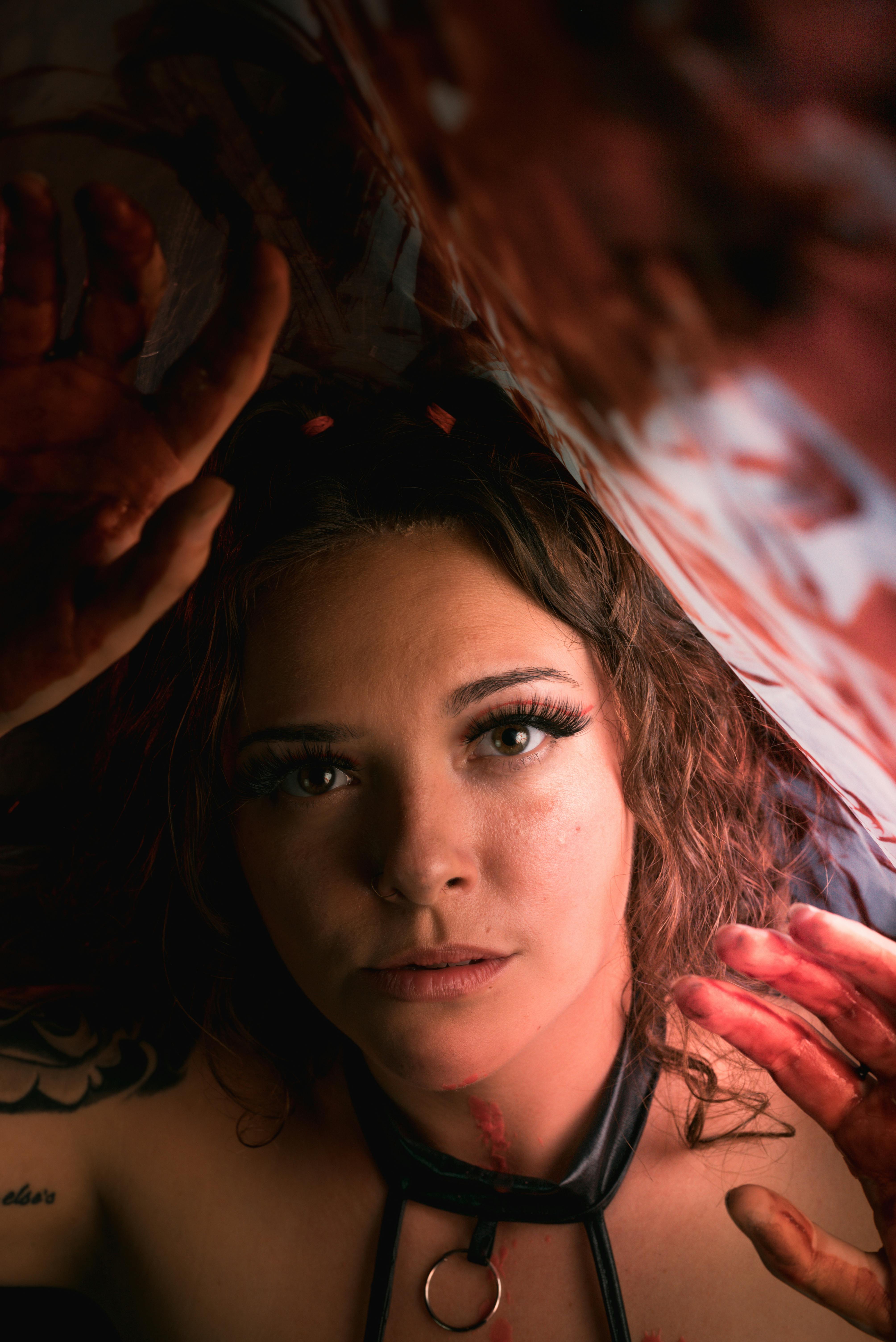Close-up of a Beautiful Woman with Bloody Hand · Free Stock Photo