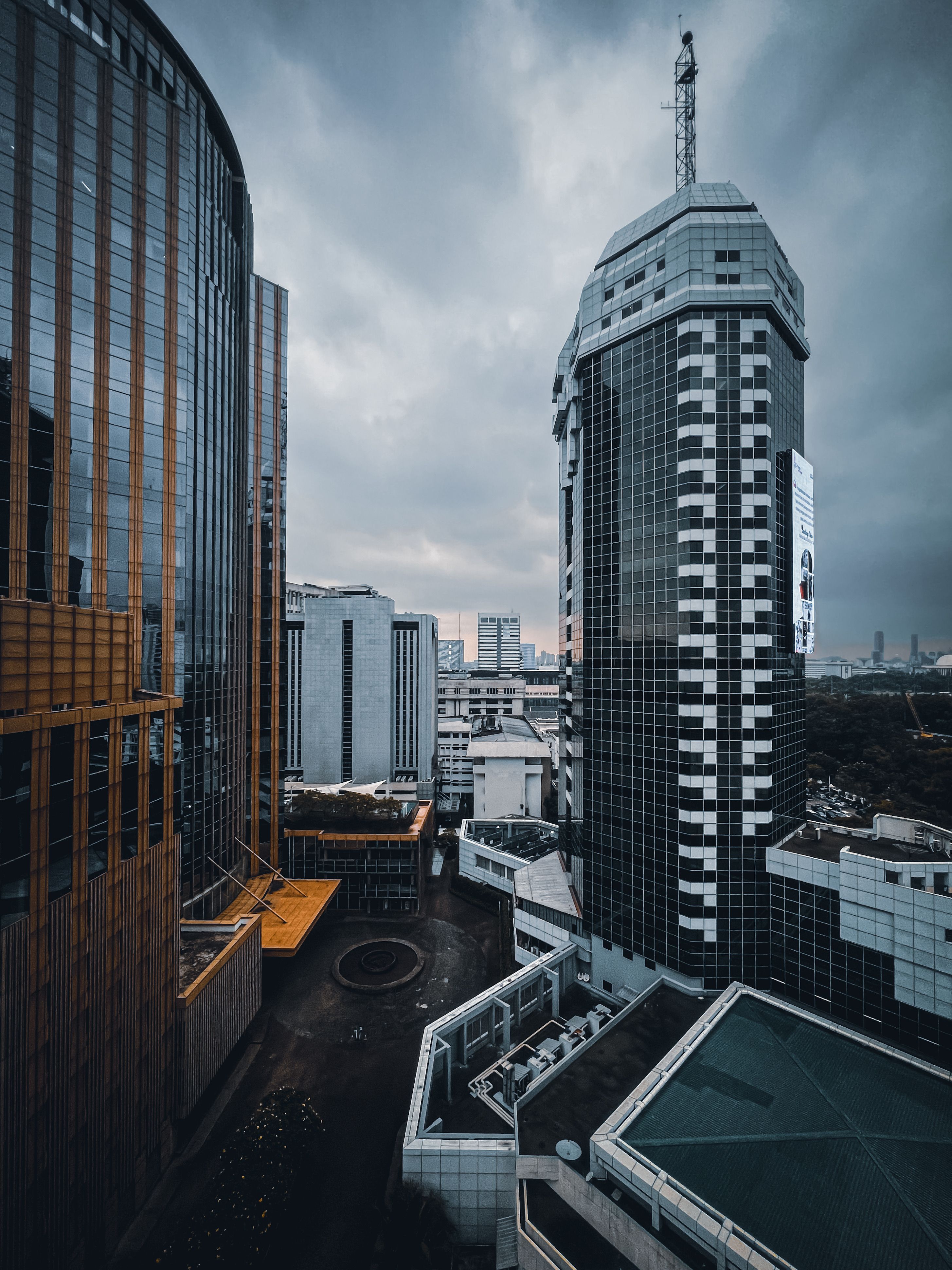 Buildings Under Cloudy Sky · Free Stock Photo