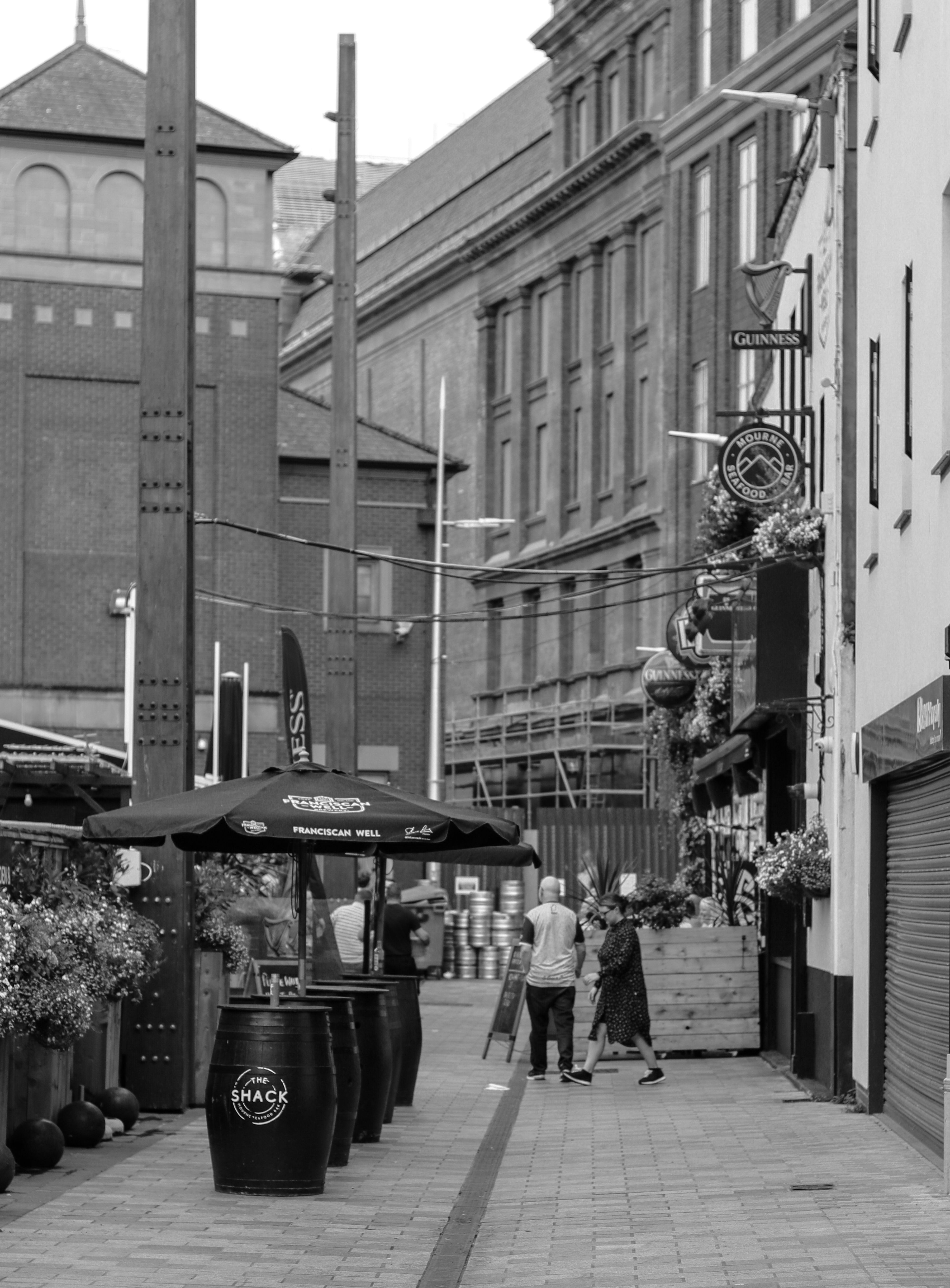 Grayscale Photo of People Walking on the Street · Free Stock Photo