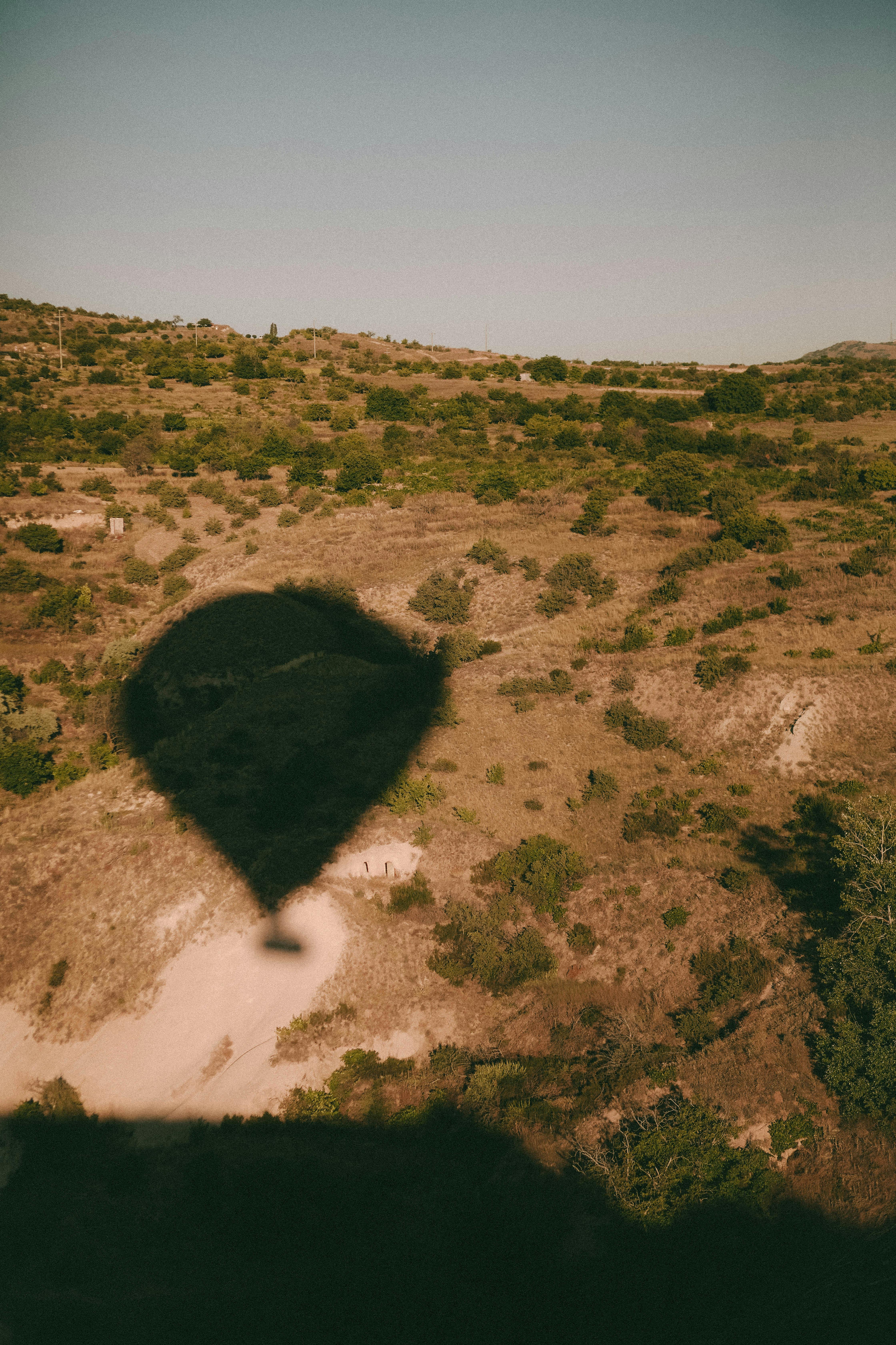 Balloon Shadow on Grassland · Free Stock Photo