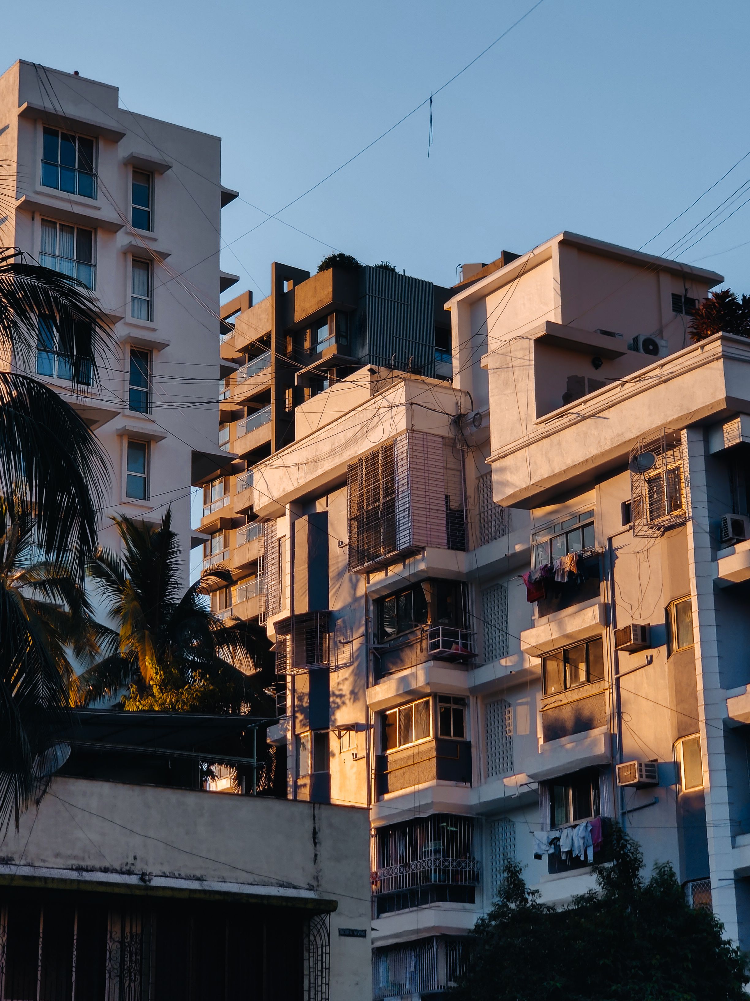 Beige Apartment Buildings Under Blue Sky · Free Stock Photo