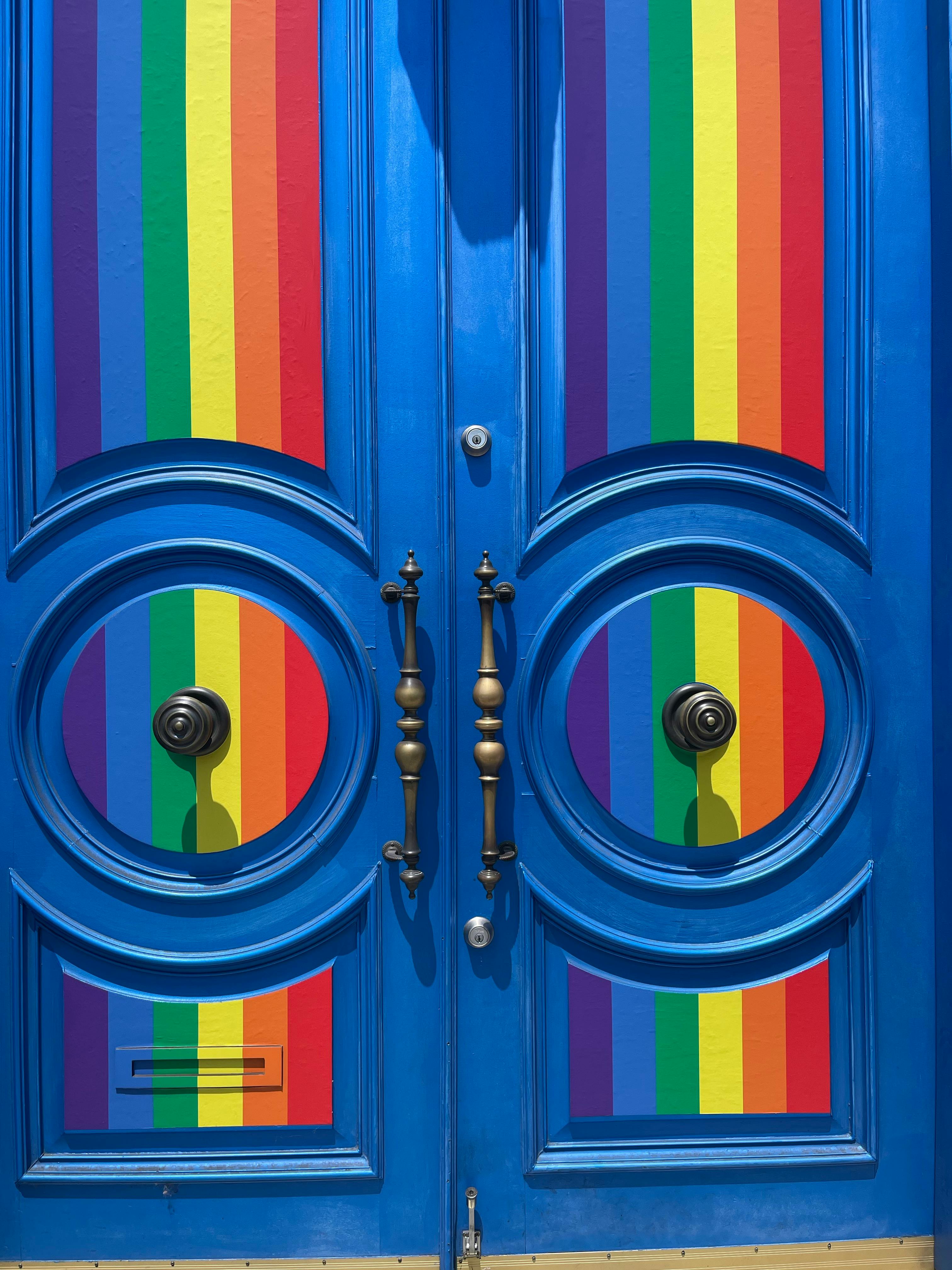 Close Up Shot of a Rainbow Door · Free Stock Photo