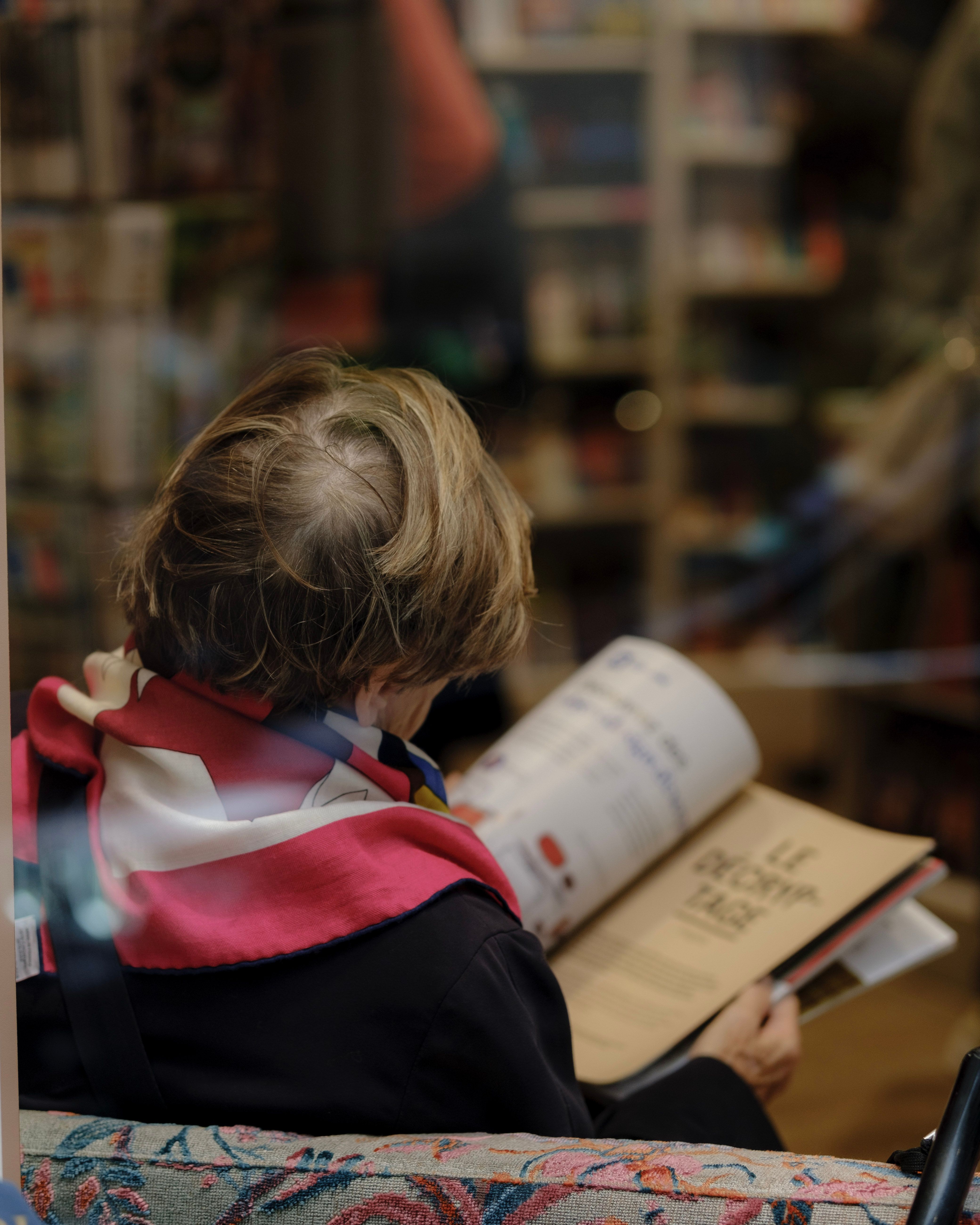 Woman Reading A Book · Free Stock Photo