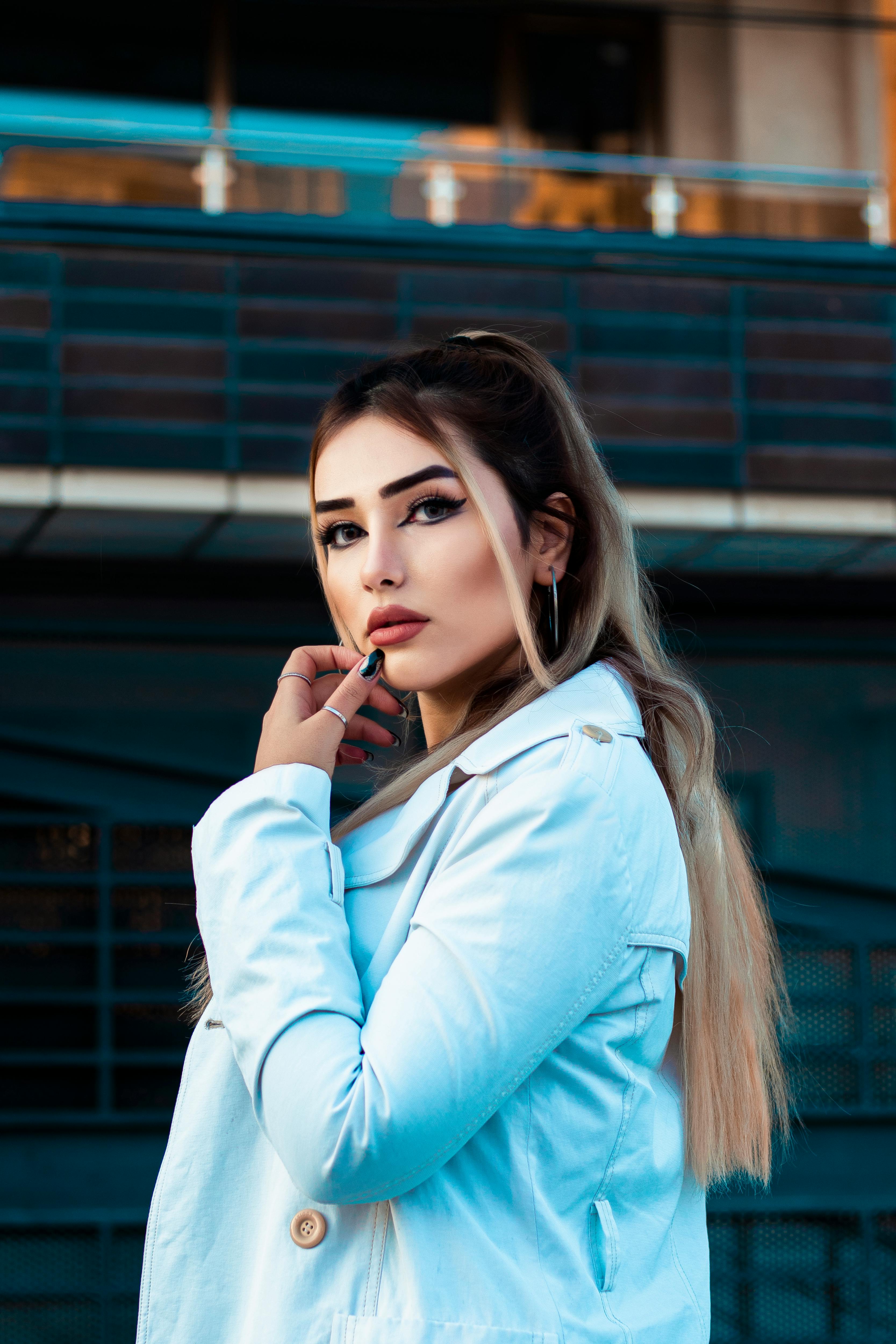 A Woman Wearing a Jacket · Free Stock Photo