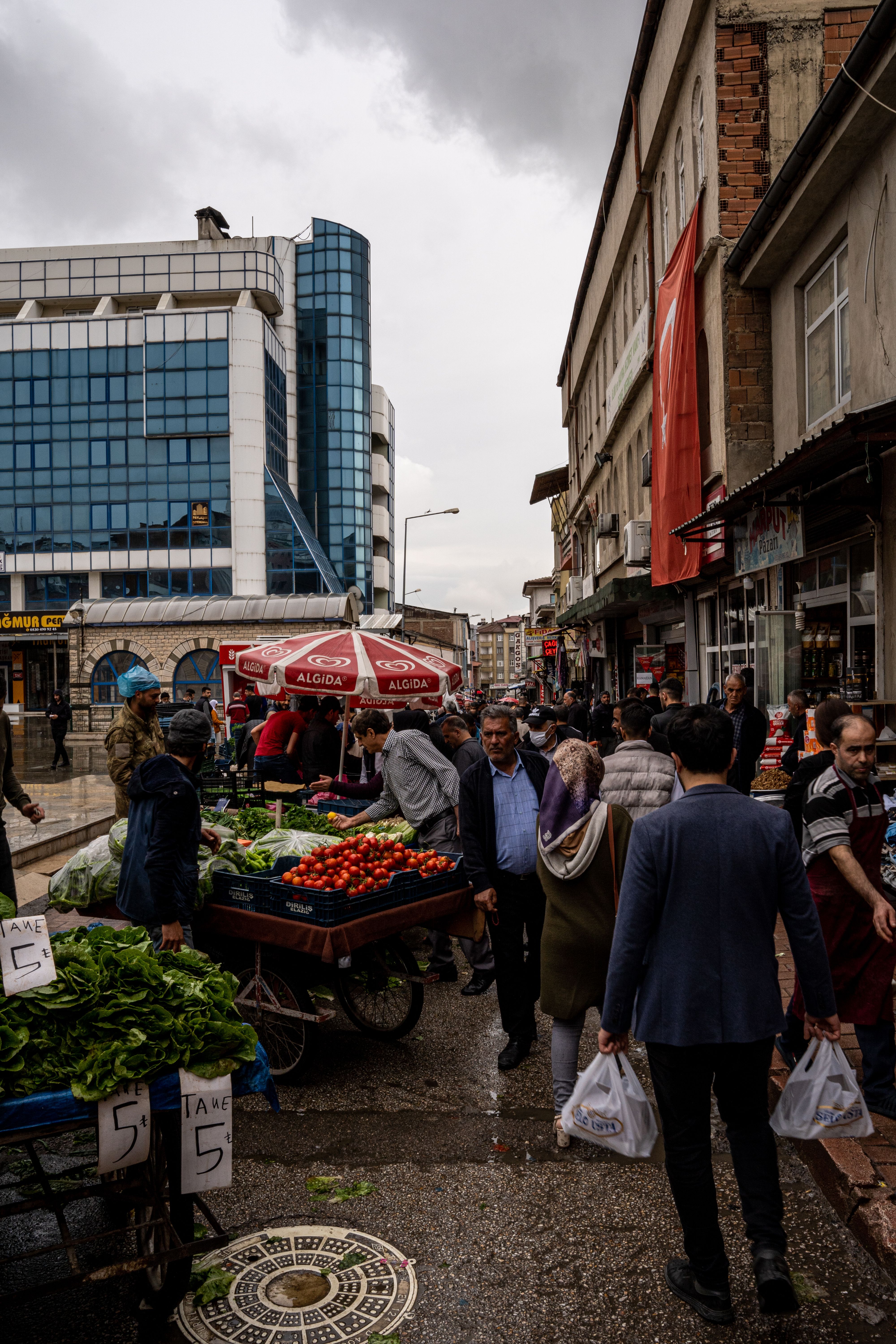 Person Walking on Market · Free Stock Photo