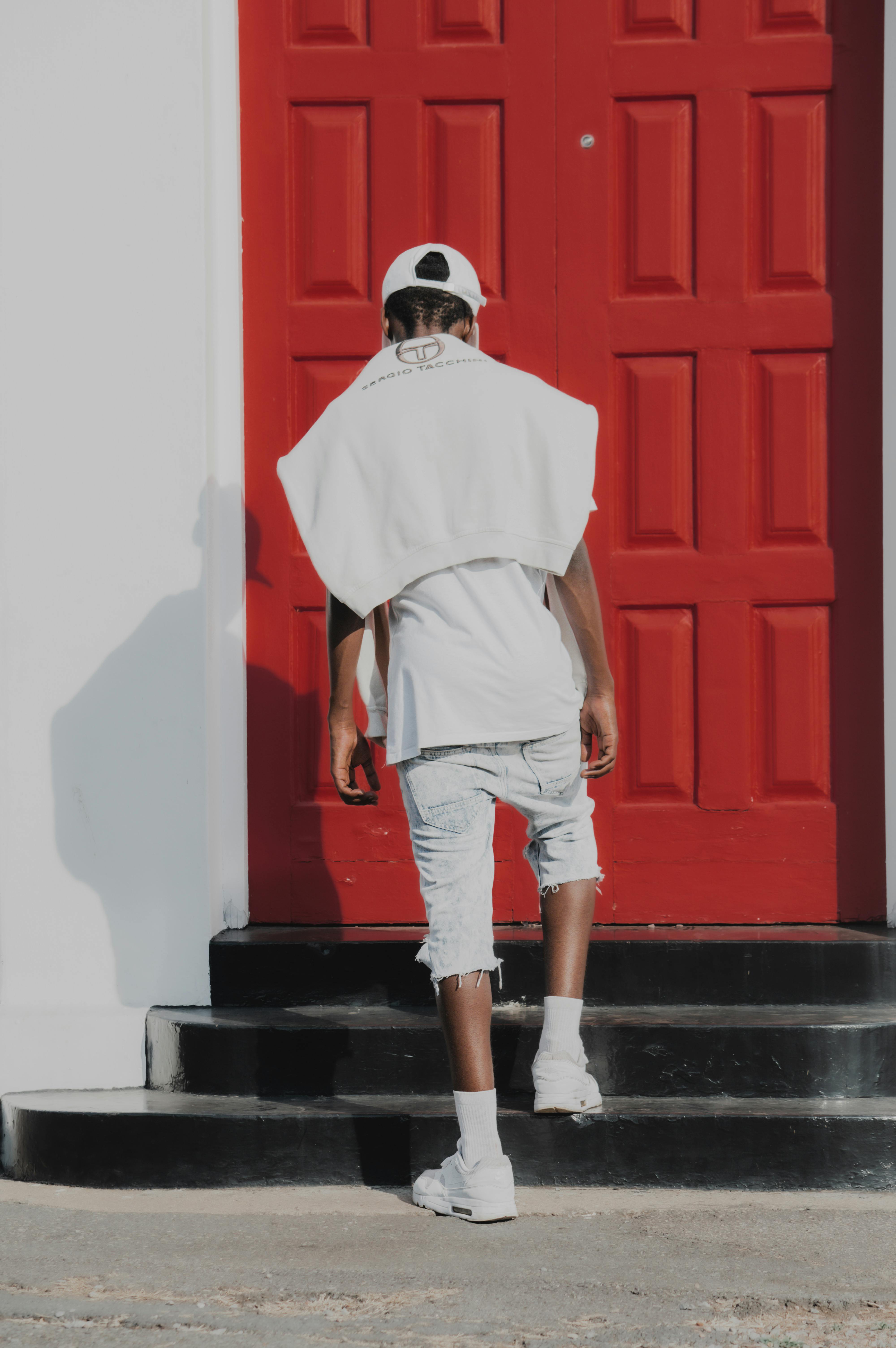 Photo of a Cowboy in a Pasture with a Rocky Mountain in the Background ...