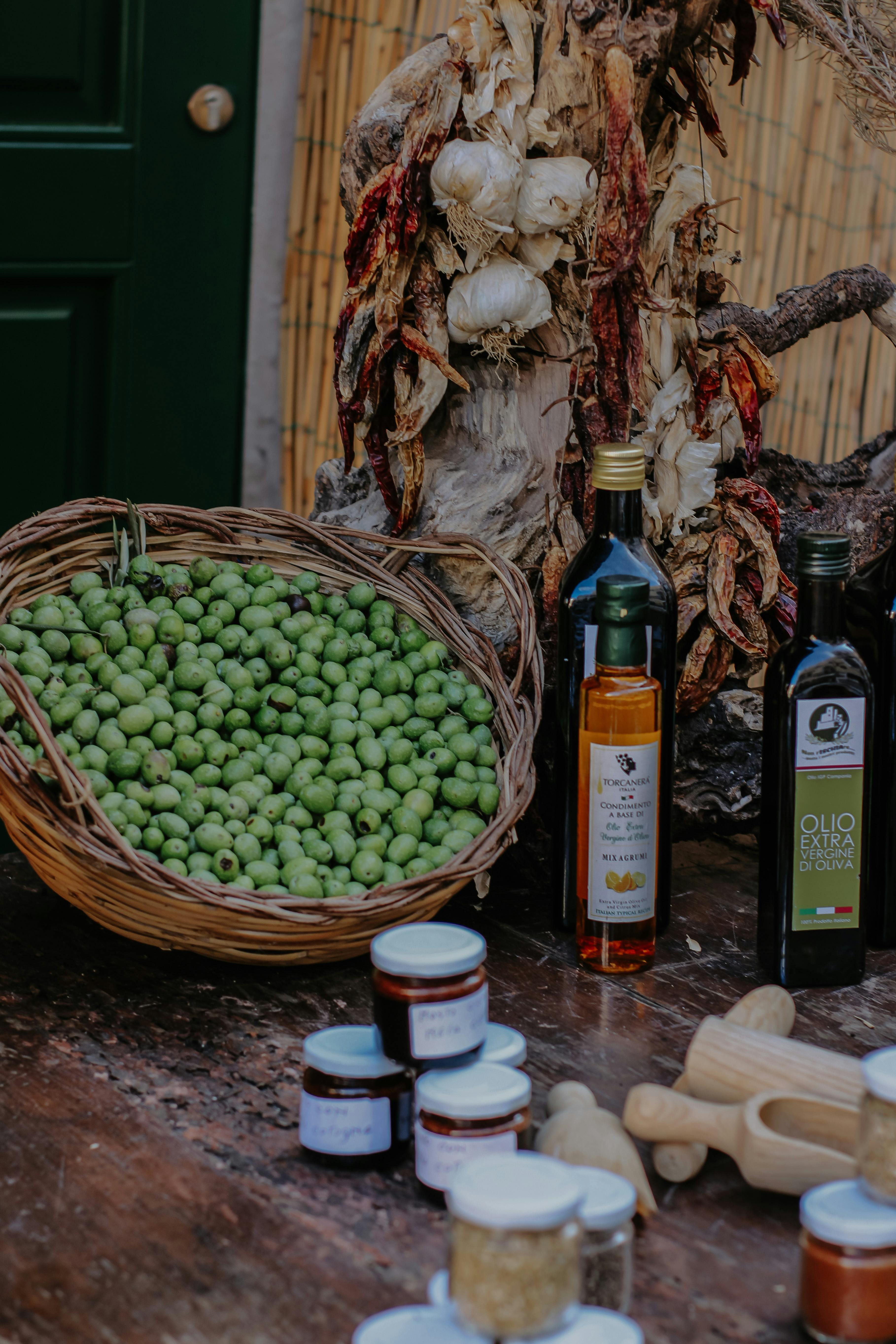 Rustic Food Market Stall with a Basket of Green Olives, Dry Vegetables ...