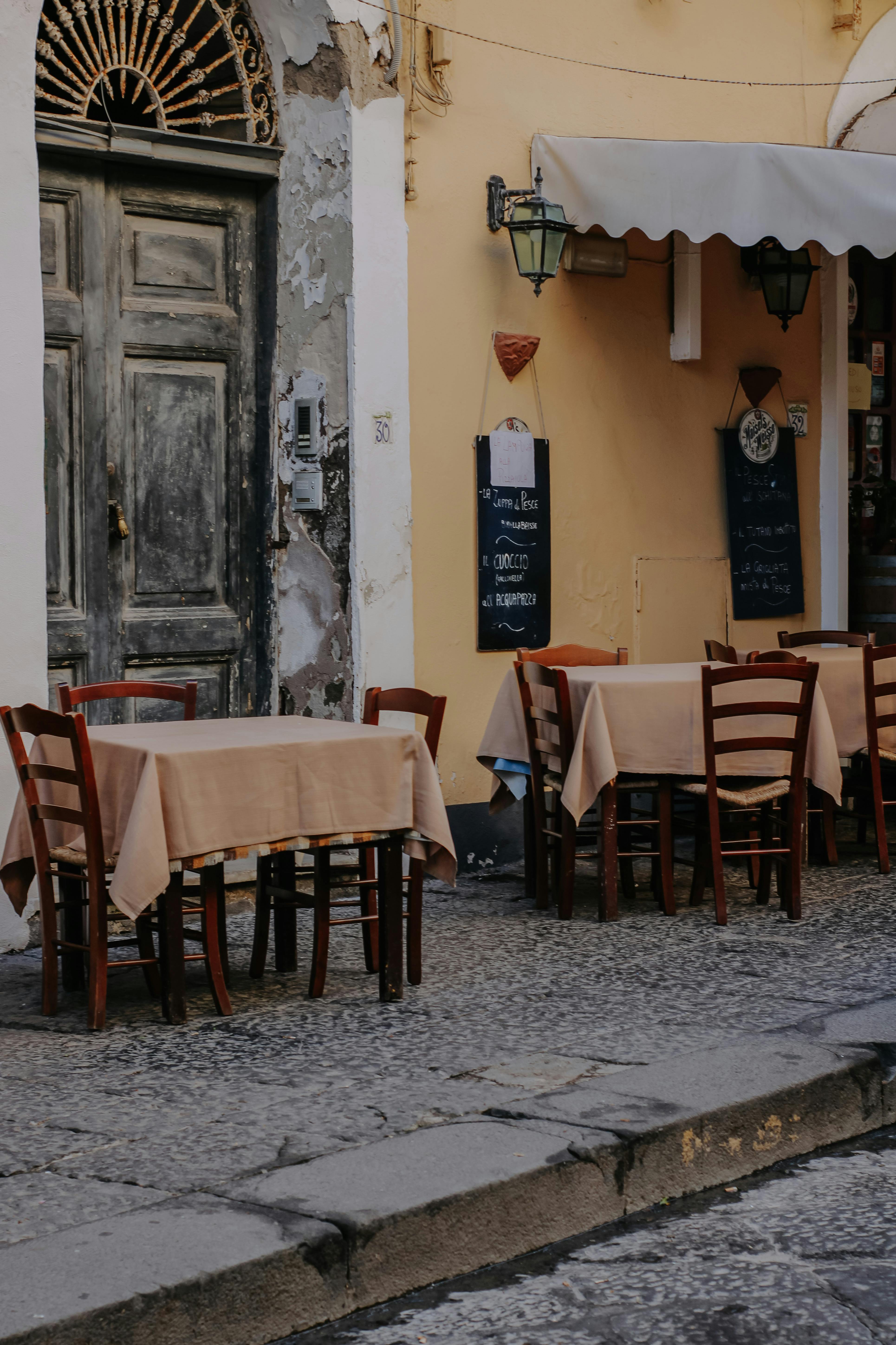 Table and Chairs at the Storefront · Free Stock Photo