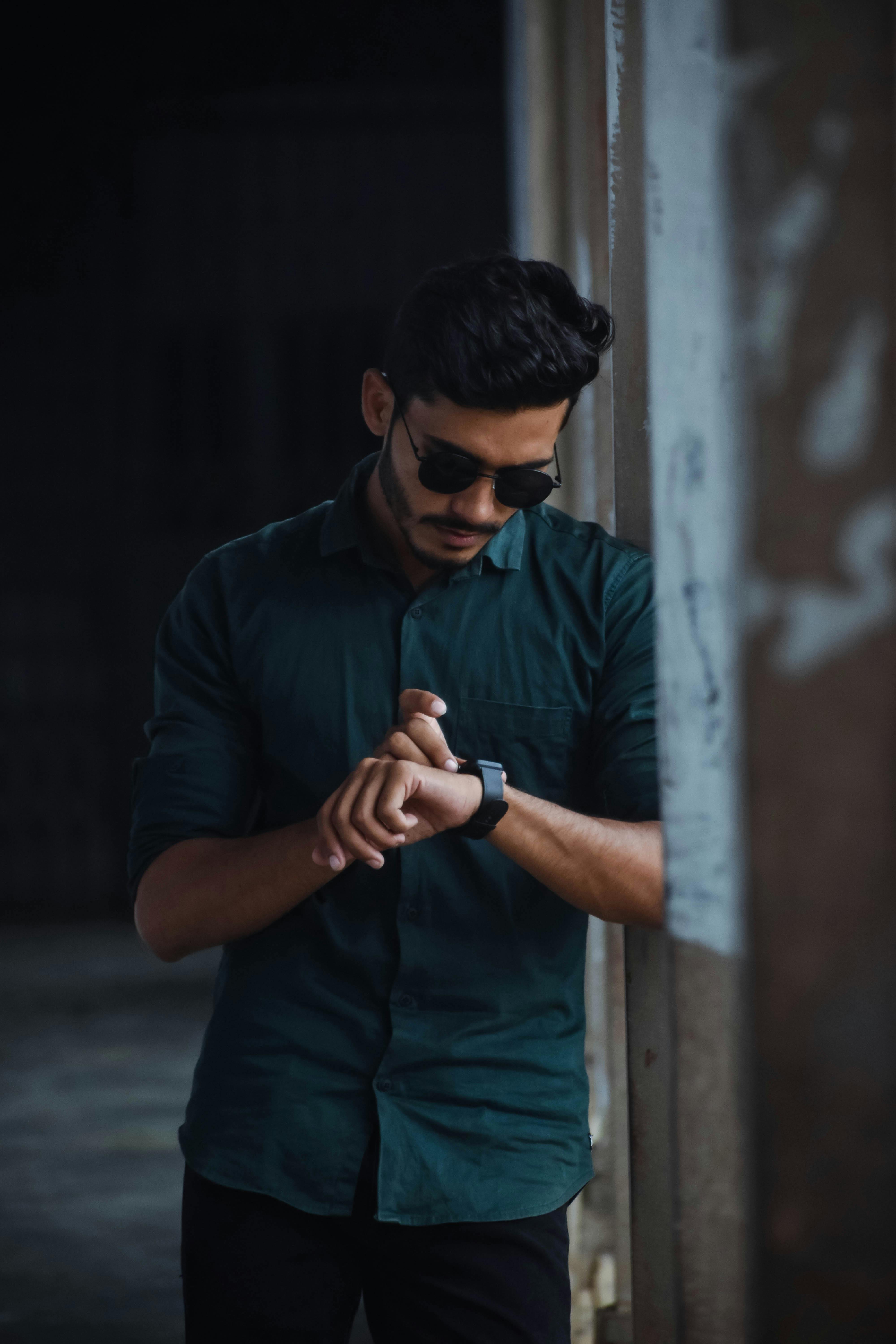 Man Using His Wristwatch · Free Stock Photo