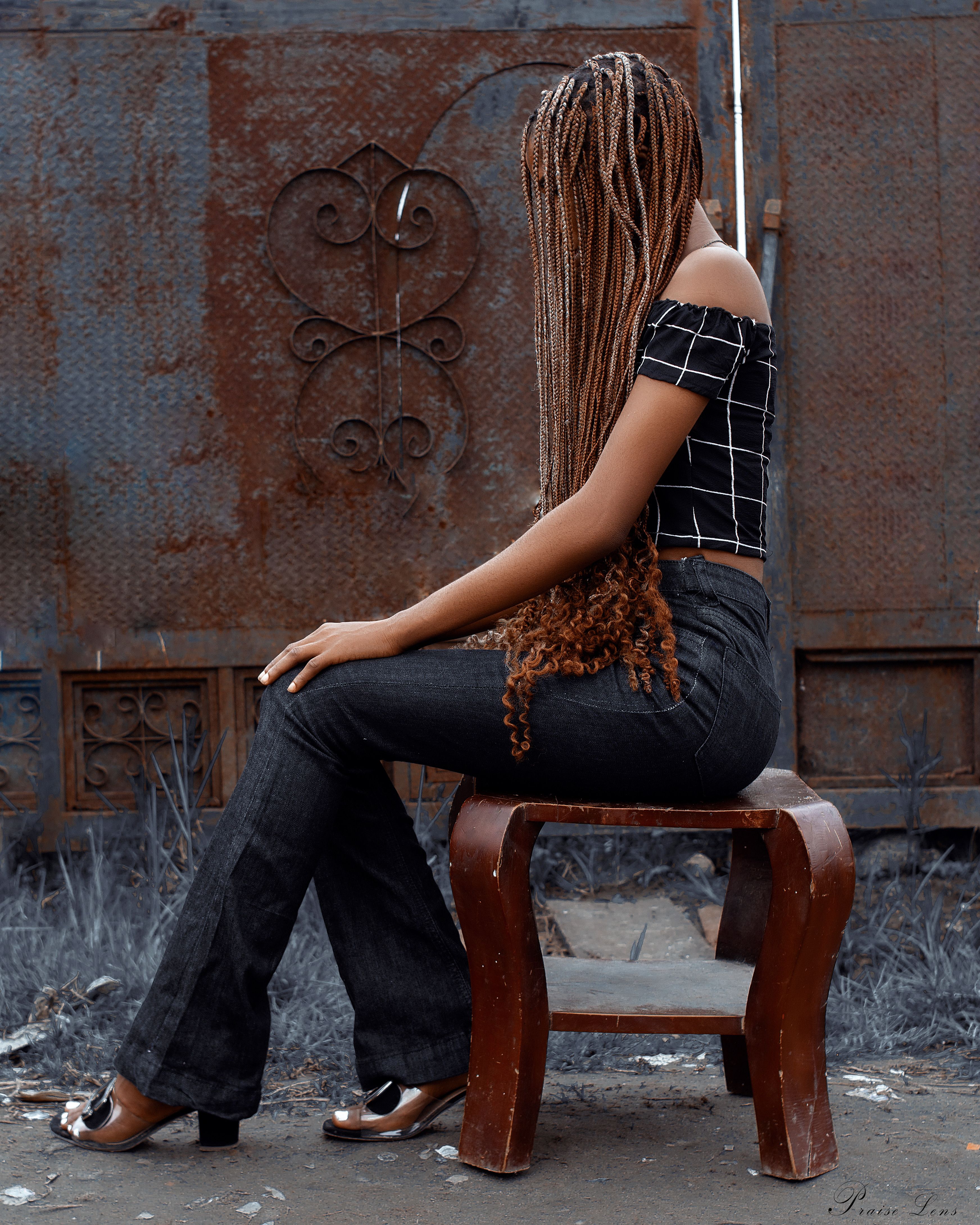Woman Sitting On Chair Side View