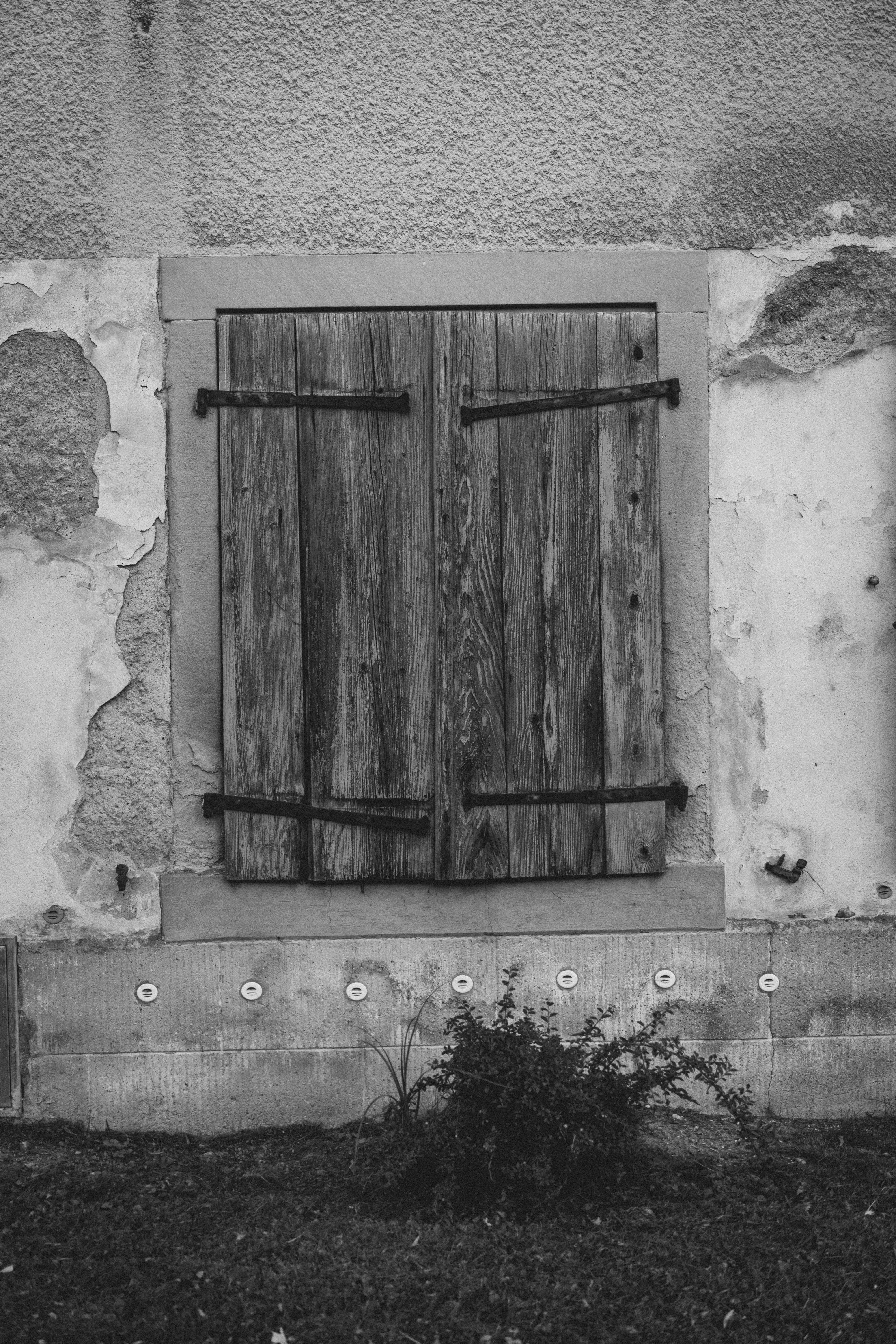 Grayscale Photo of a Wooden Window · Free Stock Photo