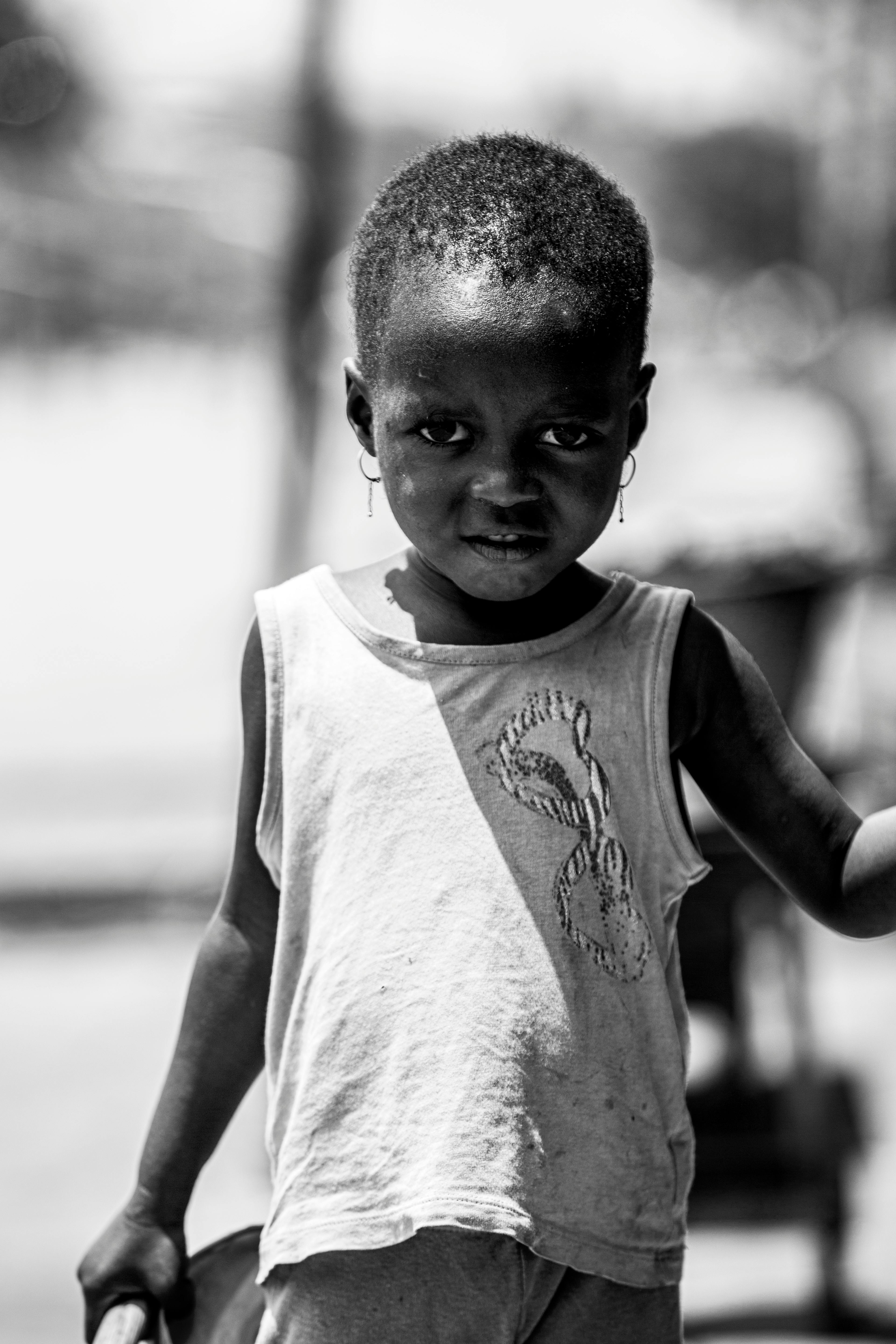 Grayscale Photo of a Kid · Free Stock Photo