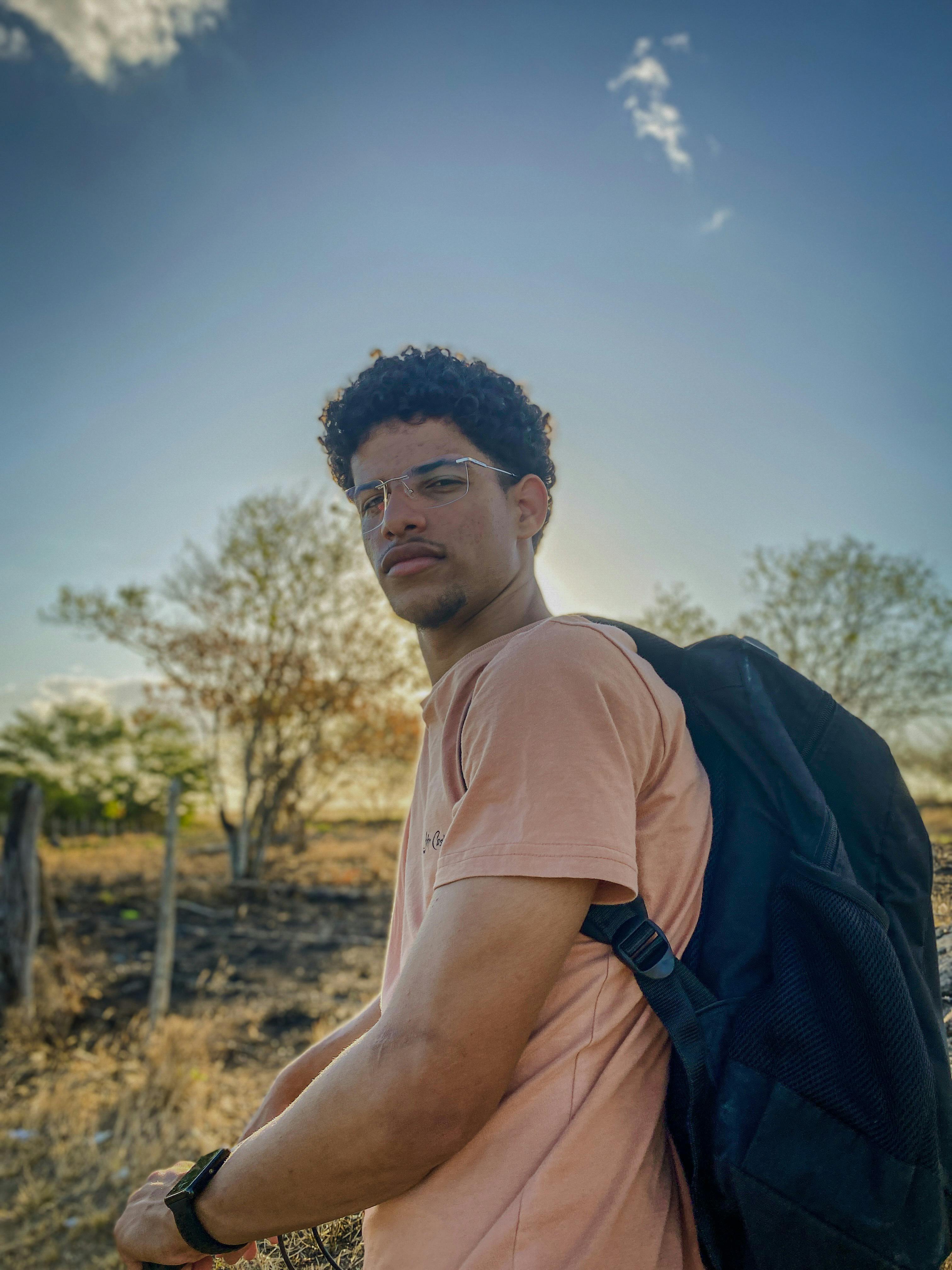 Man Carrying a Backpack · Free Stock Photo