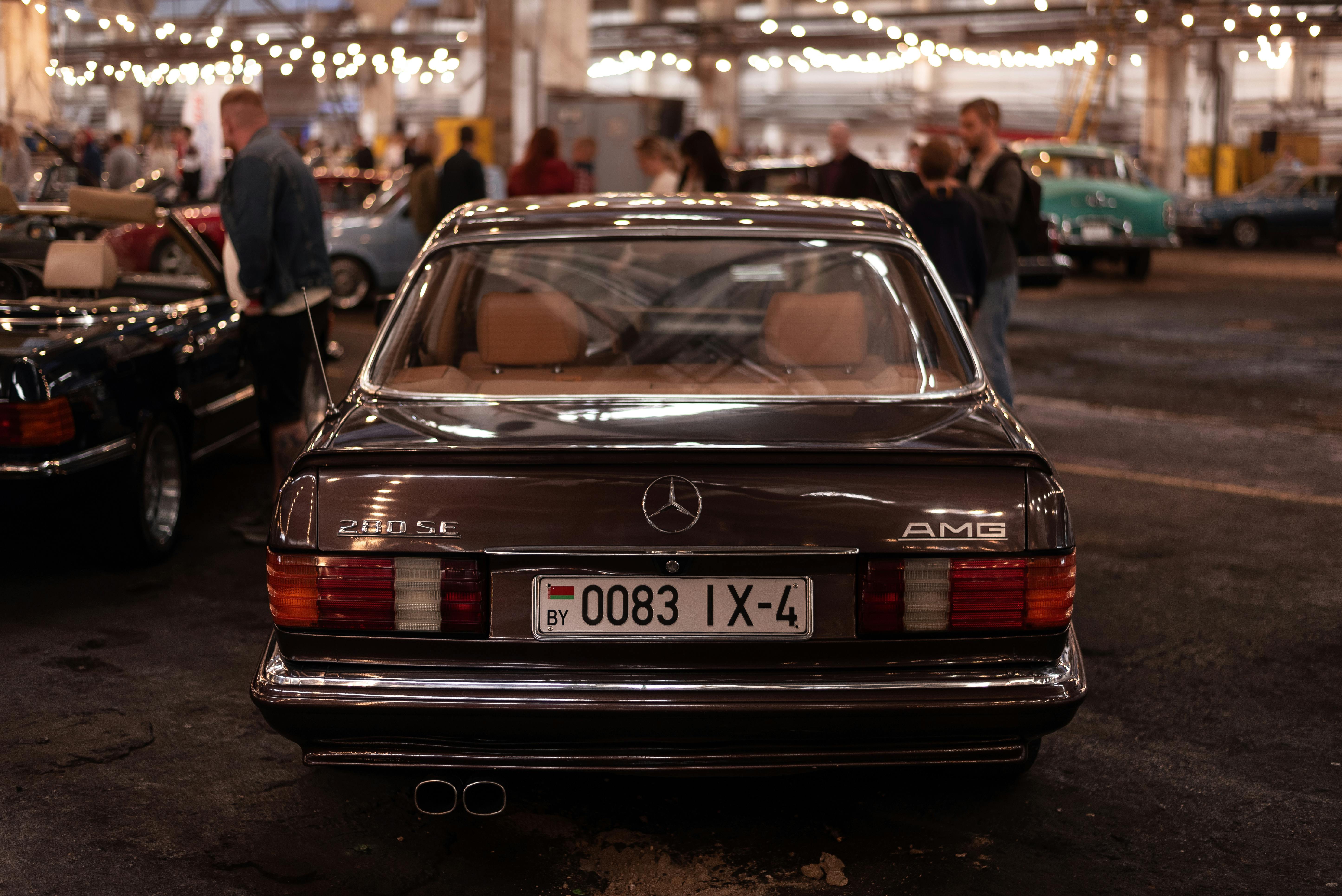 Brown Mercedes Benz C Classic Car at a Car Show · Free Stock Photo