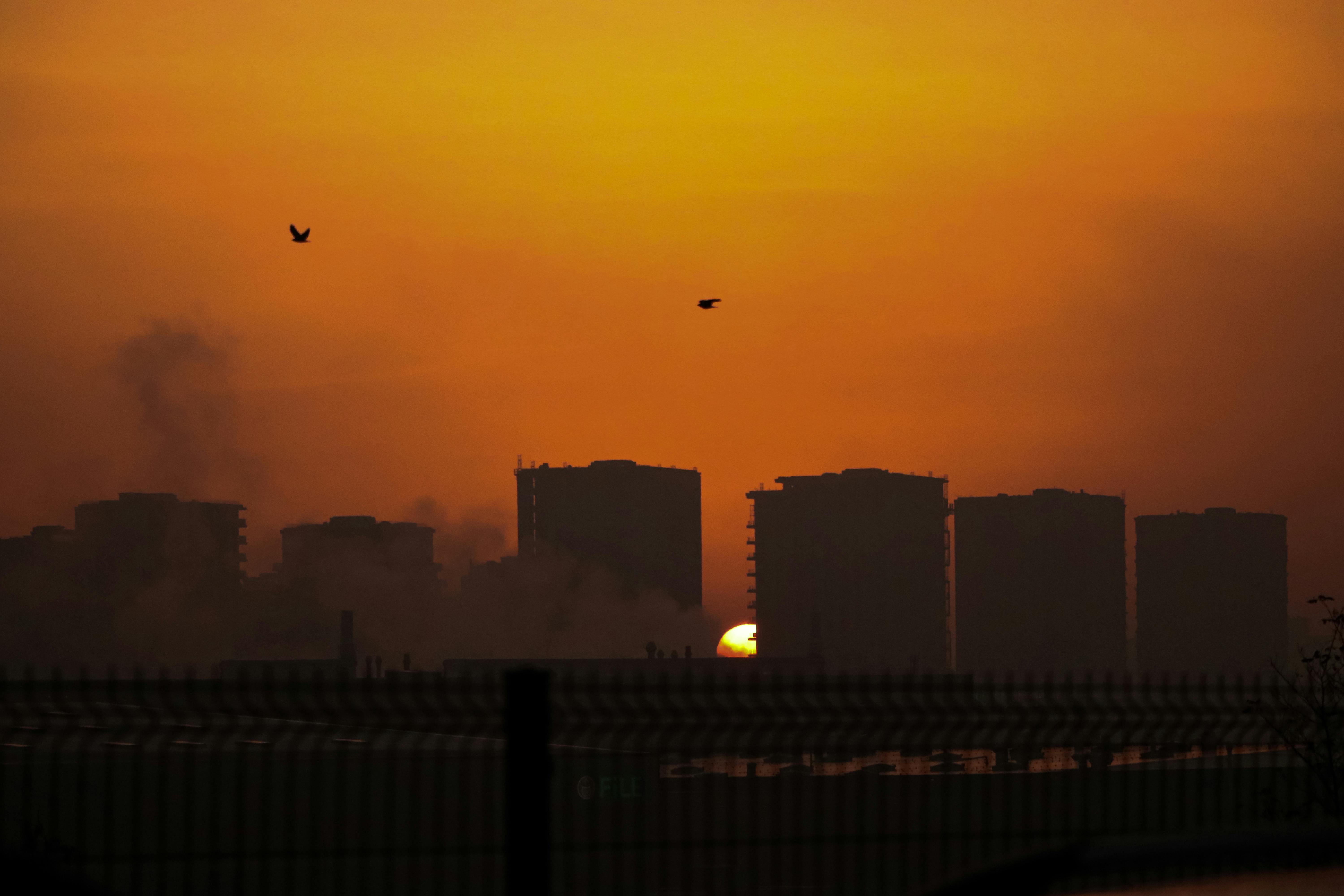 City Buildings During Sunset · Free Stock Photo