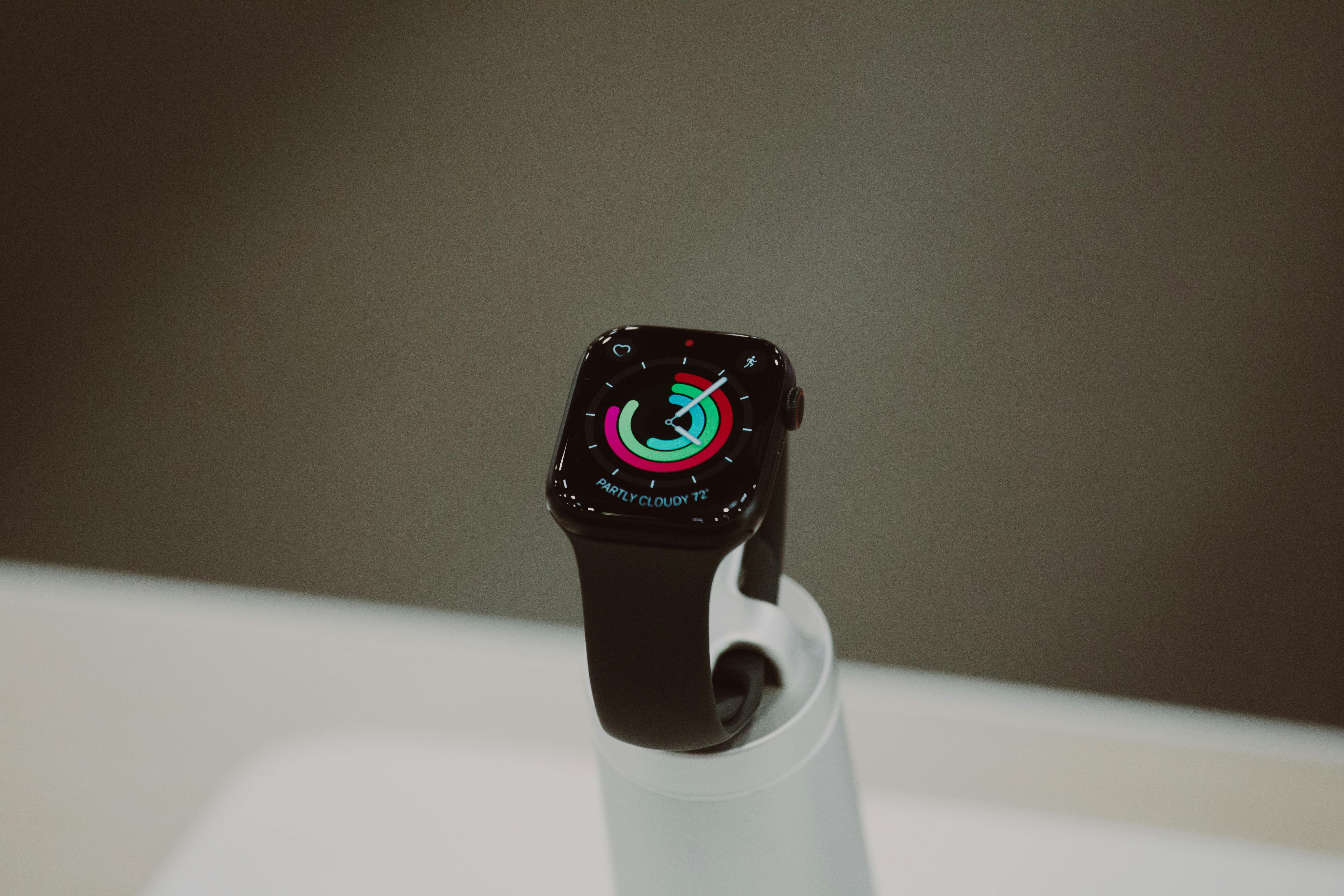 A Person Wearing White Apple Watch · Free Stock Photo