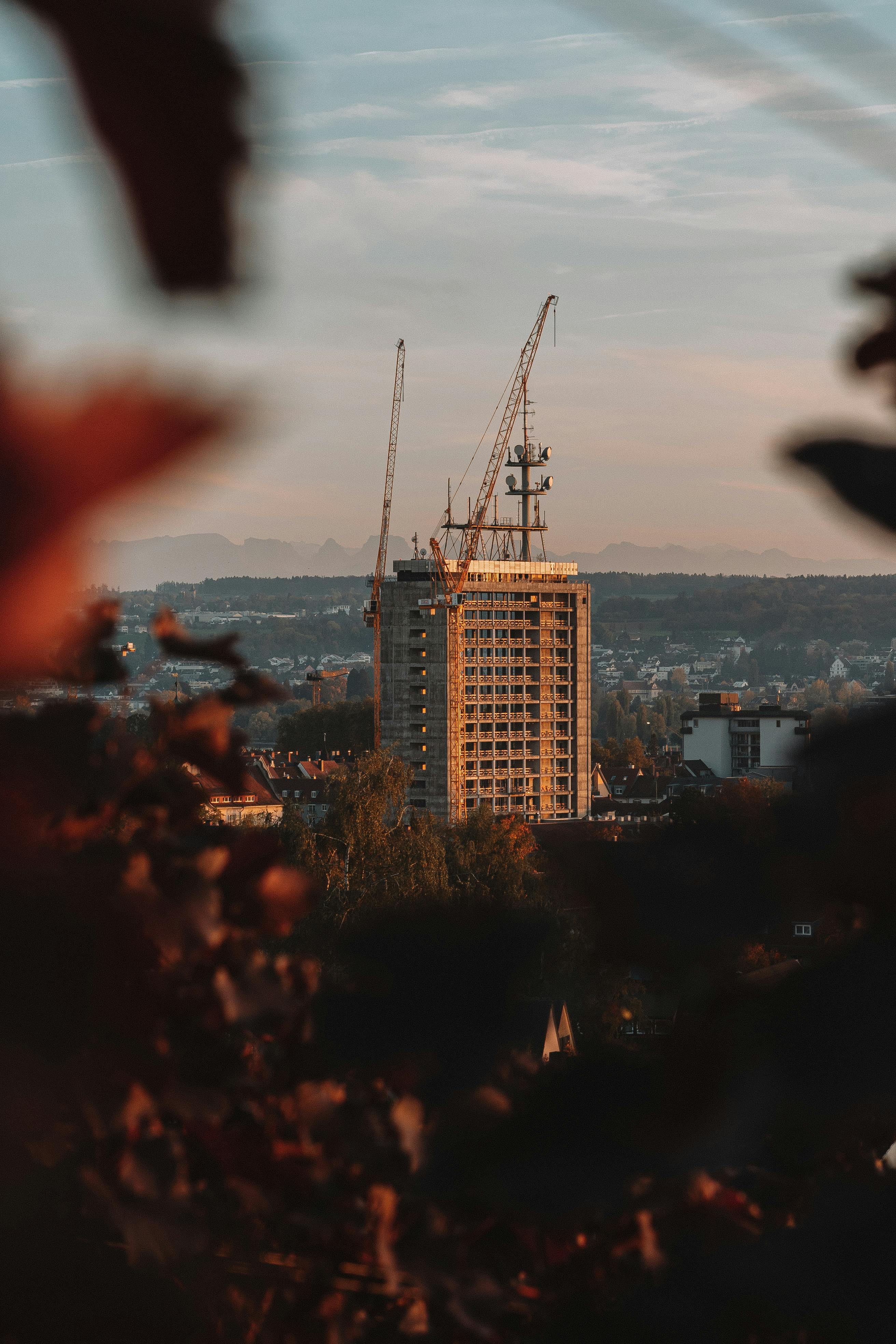 High Apartment Building Under Construction · Free Stock Photo