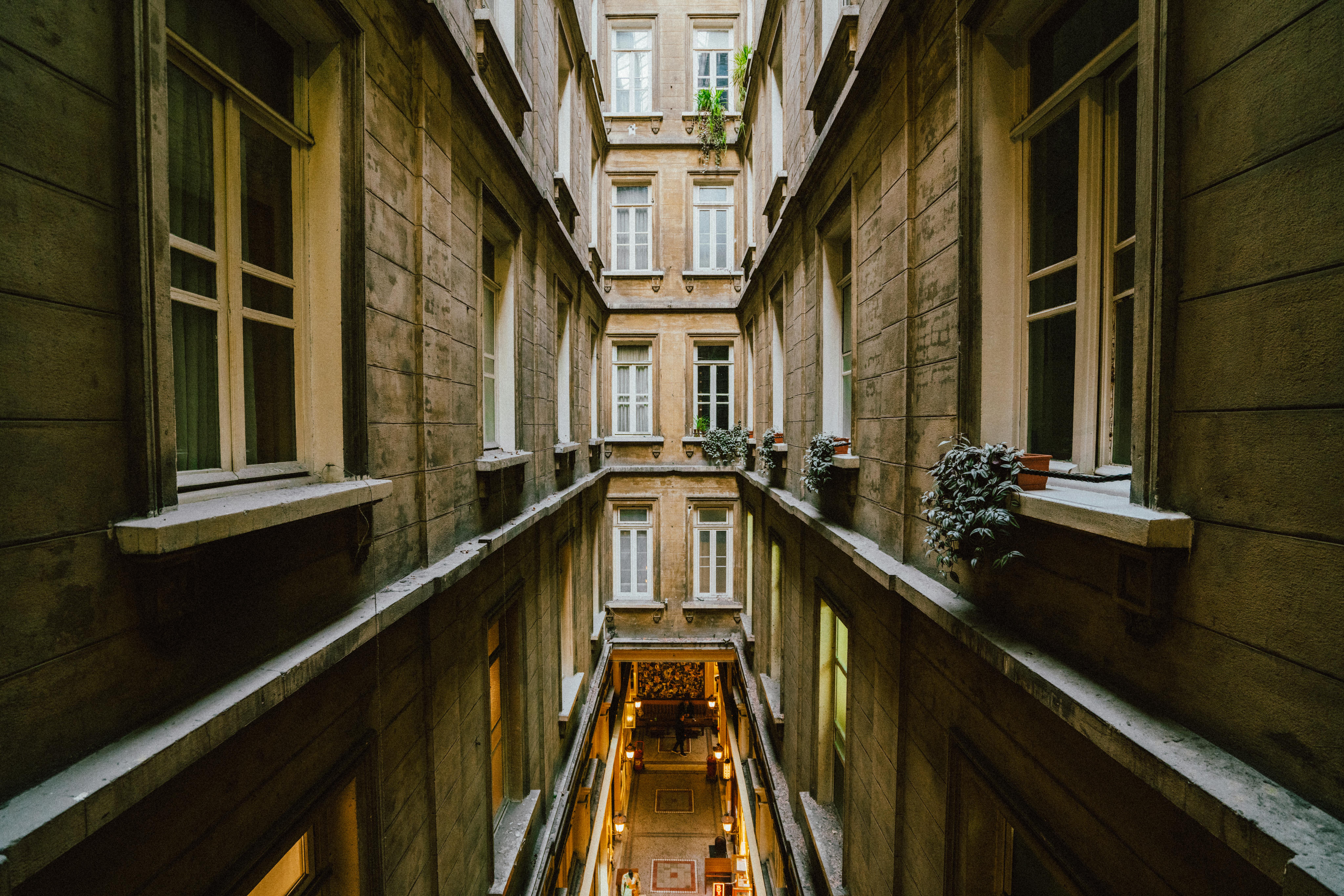 Narrow Space between Buildings Walls · Free Stock Photo