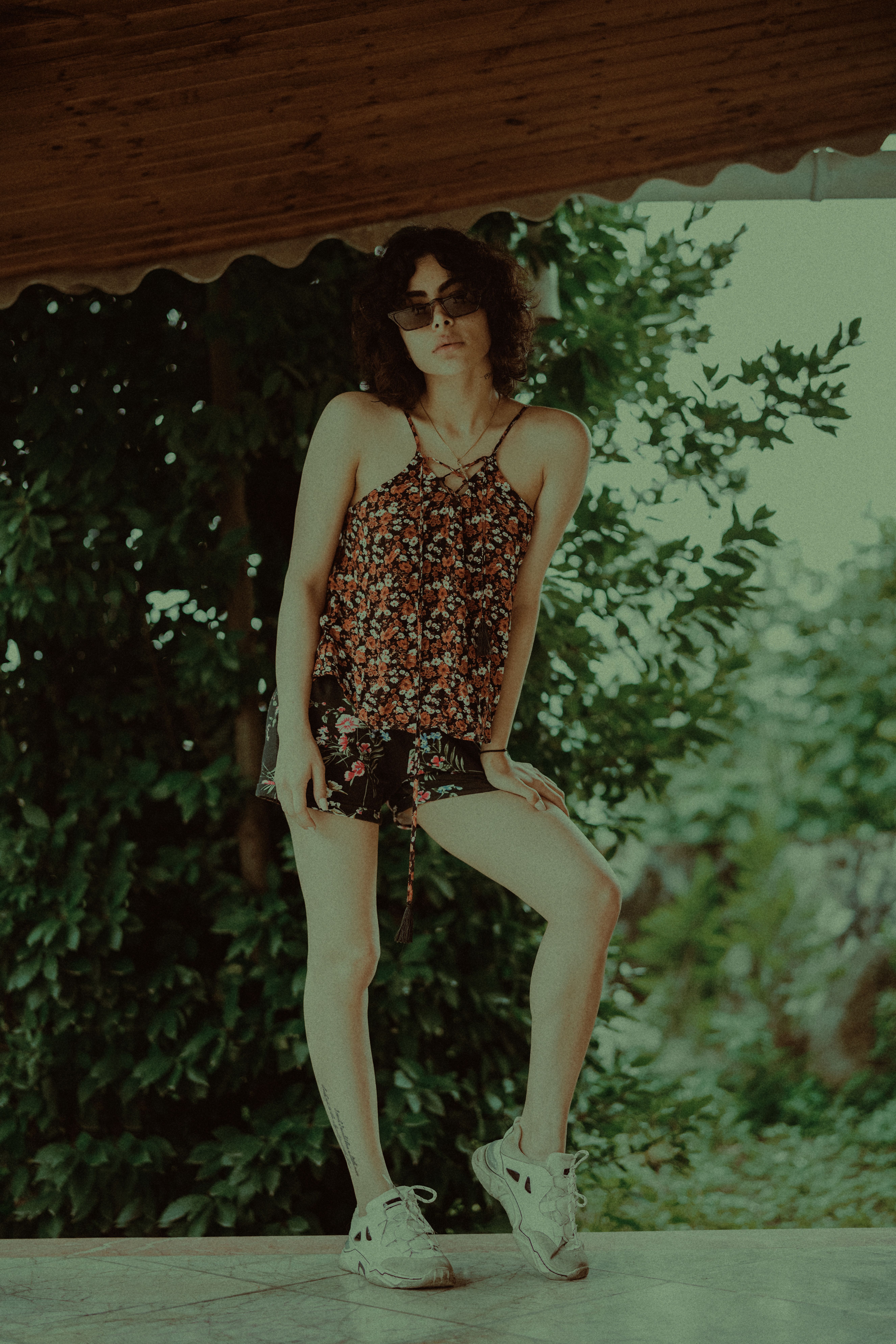 Beautiful Woman Wearing Floral Top · Free Stock Photo
