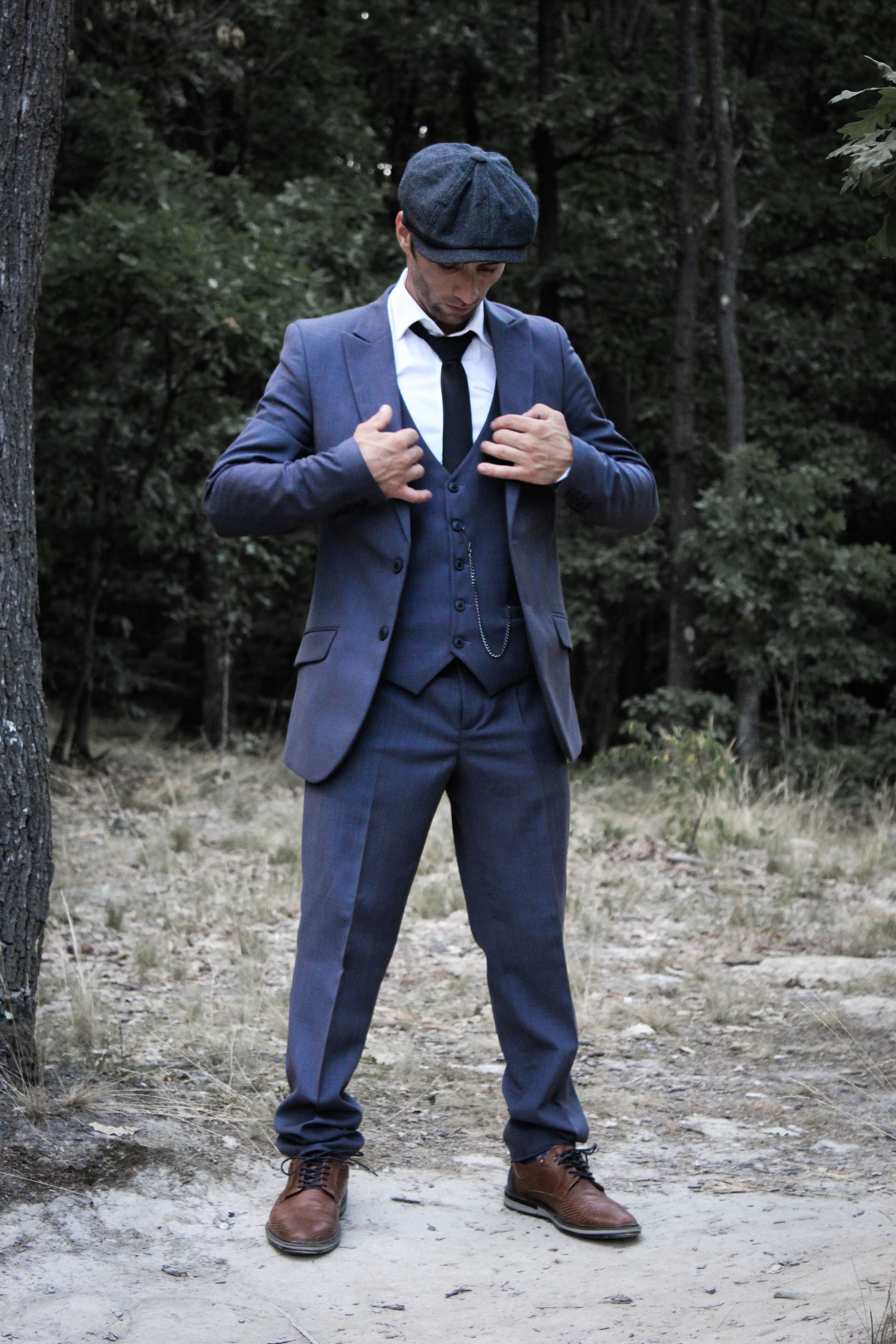 A Man in Blu Suit and Hat · Free Stock Photo