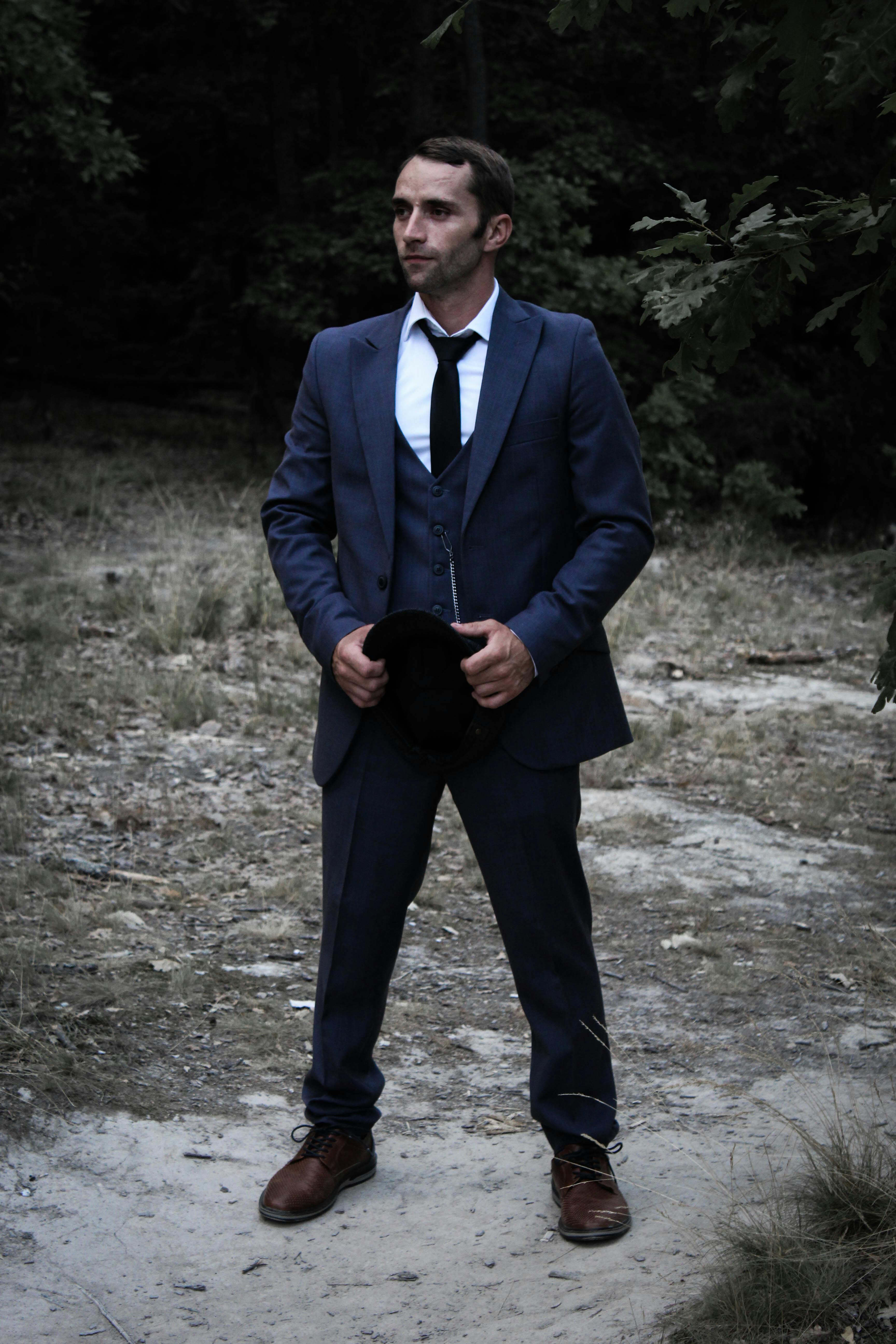 Stylish Man in Formal Wear Posing on Street · Free Stock Photo