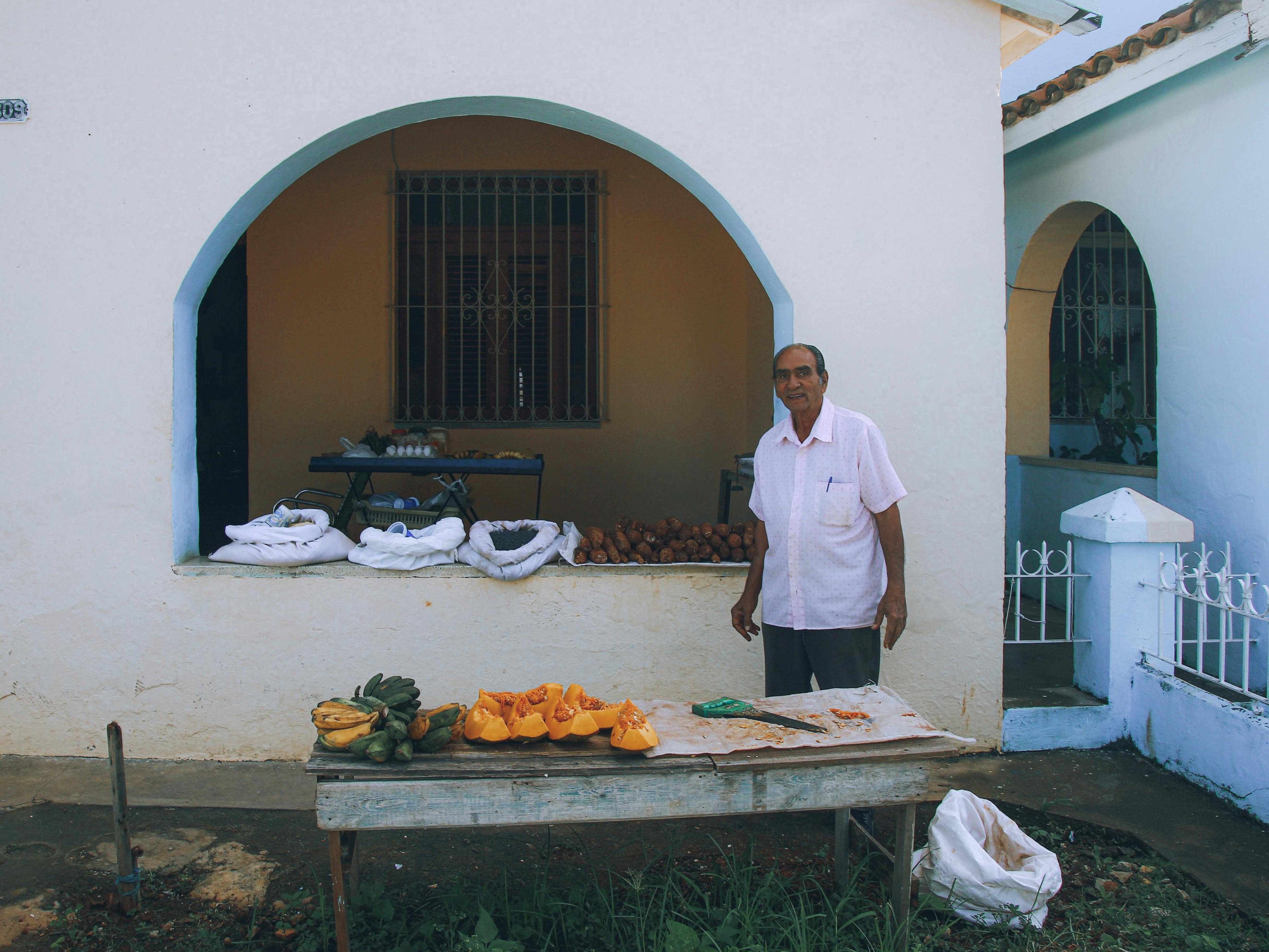 Merchant Selling Fresh Food · Free Stock Photo