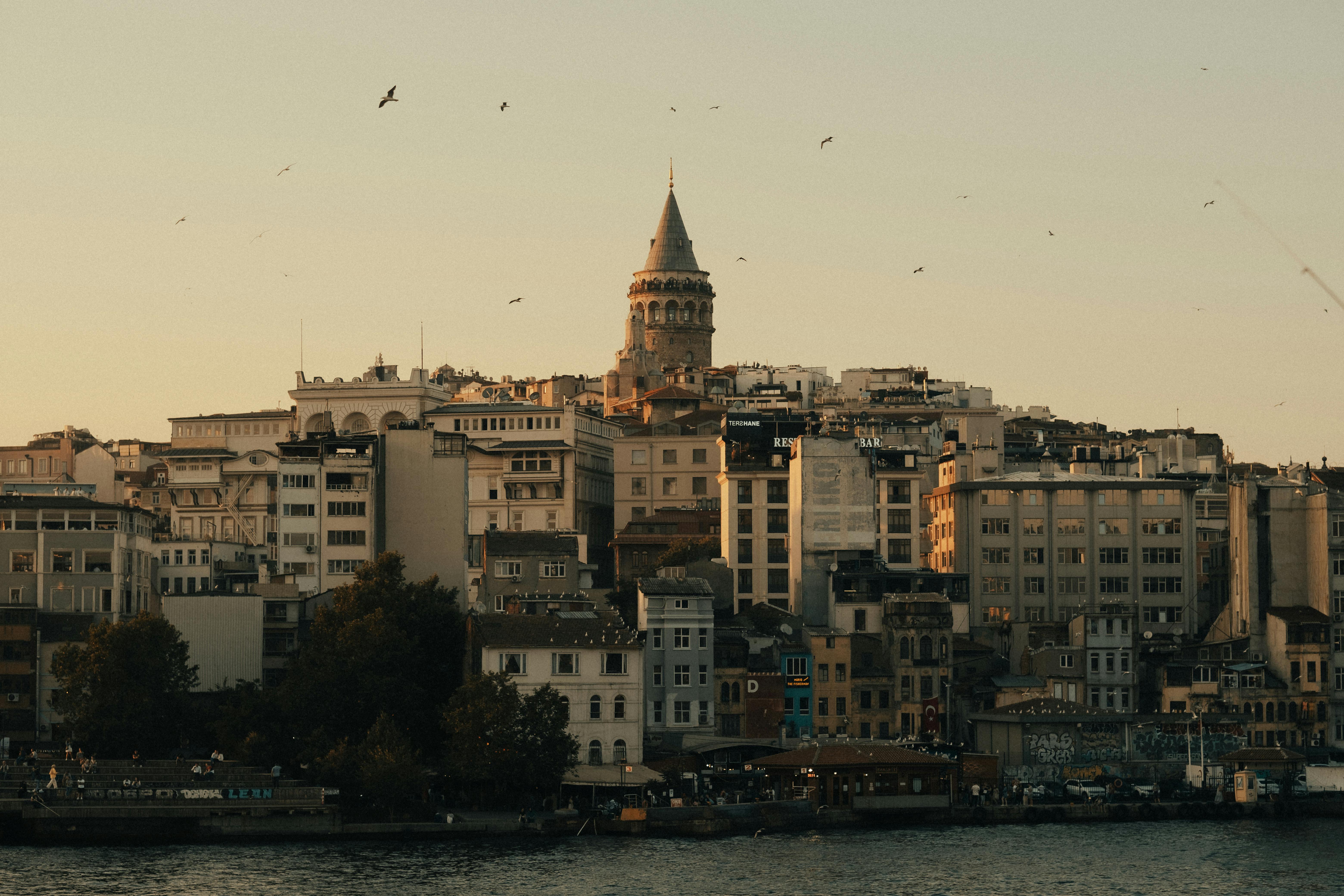 The Galata Bridge over River with Galata Tower on the Background during ...