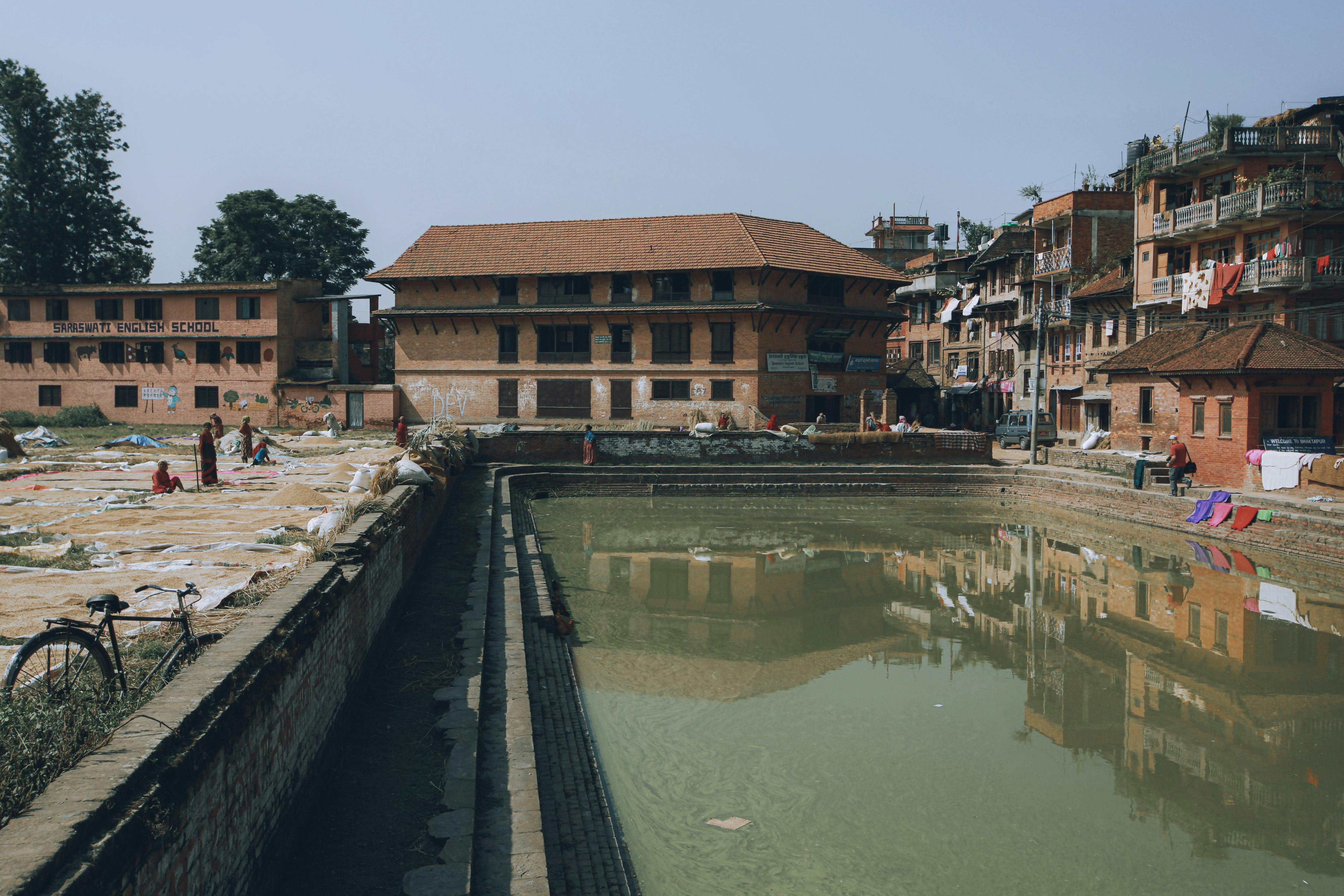 Pool among Residential Buildings · Free Stock Photo