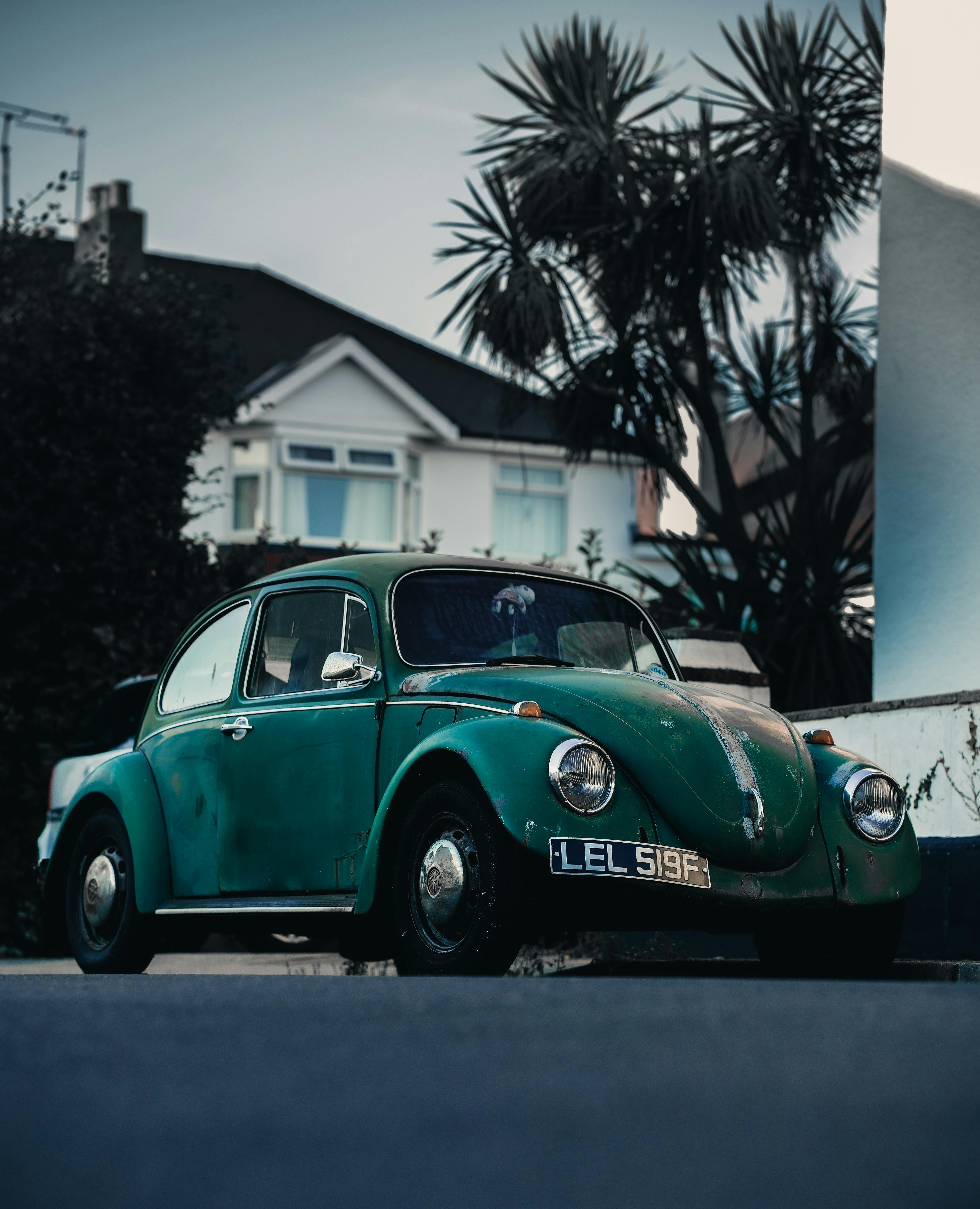 Photograph of a Green Volkswagen Beetle · Free Stock Photo