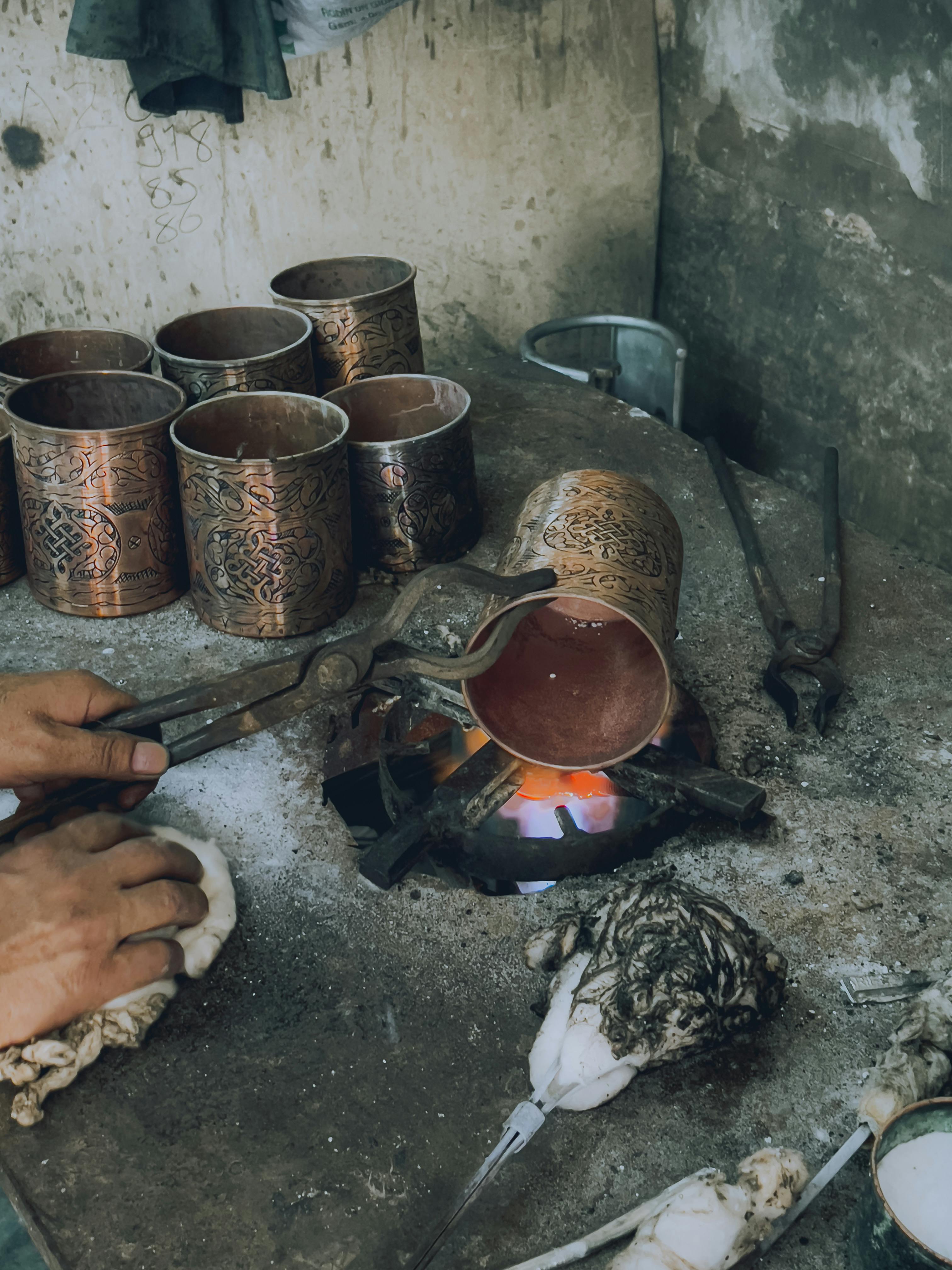 Man Handcrafting Traditional Cups · Free Stock Photo