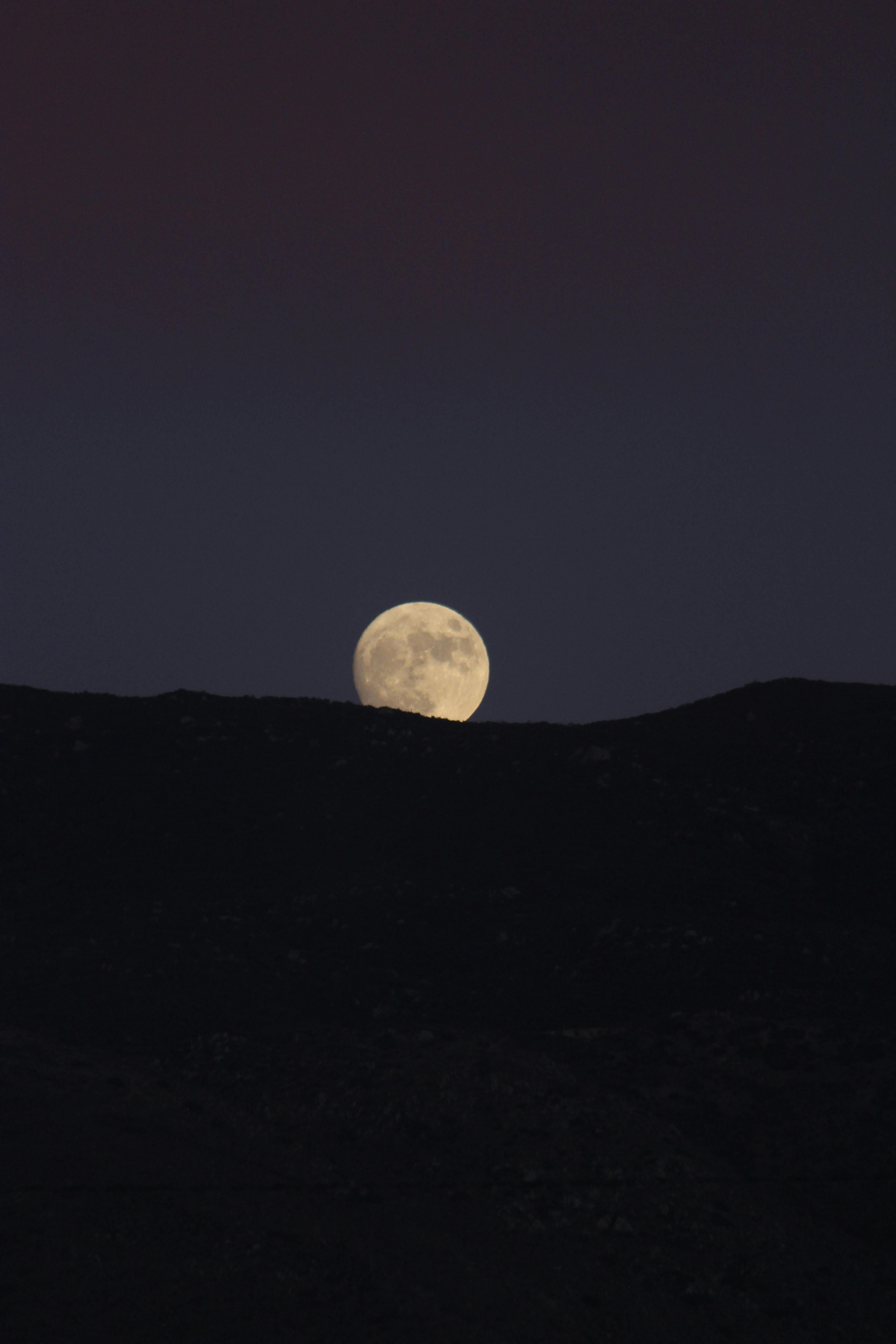 Moon Behind a Mountain · Free Stock Photo