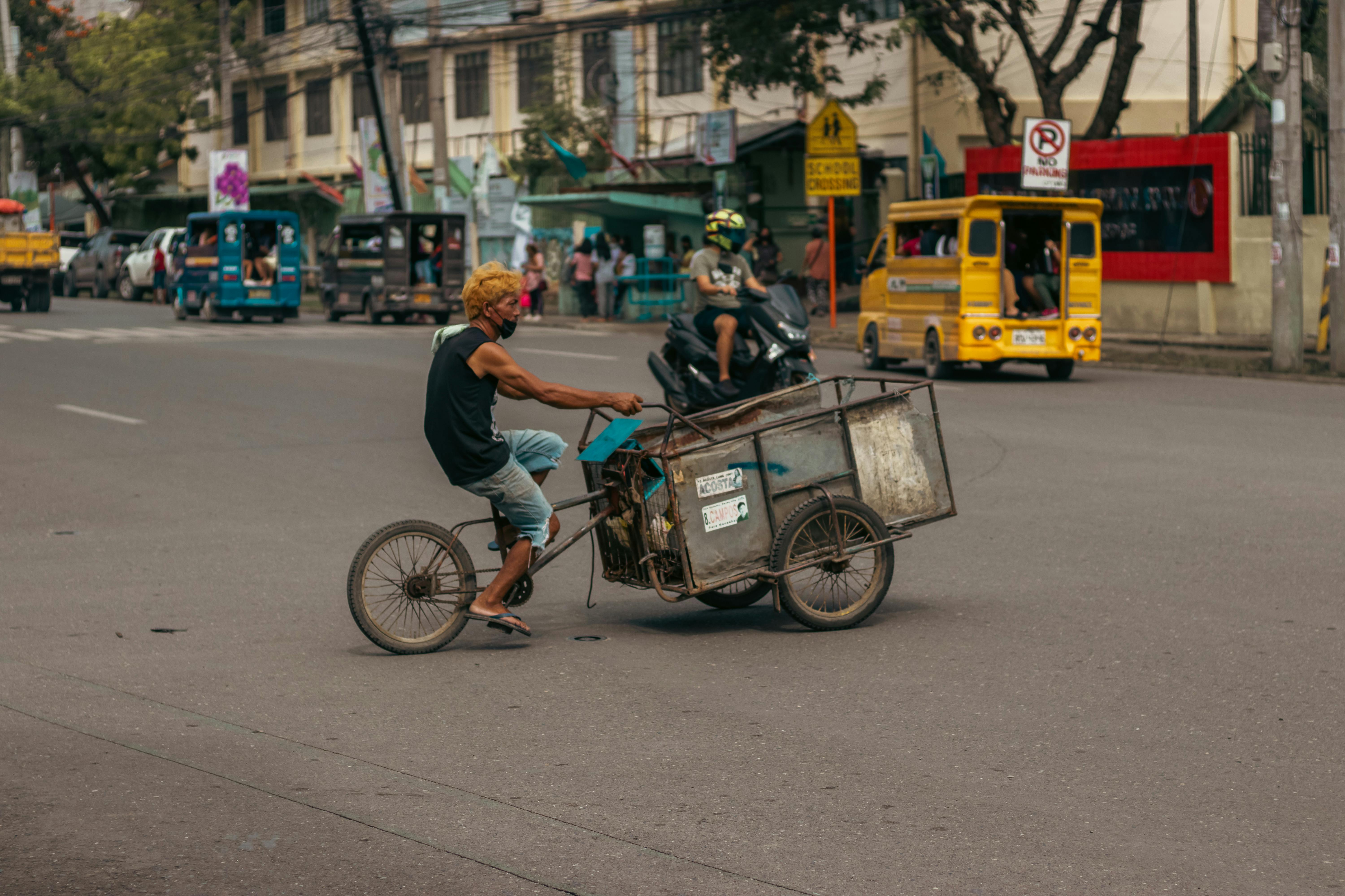 Man on Tricycle with Trailer · Free Stock Photo