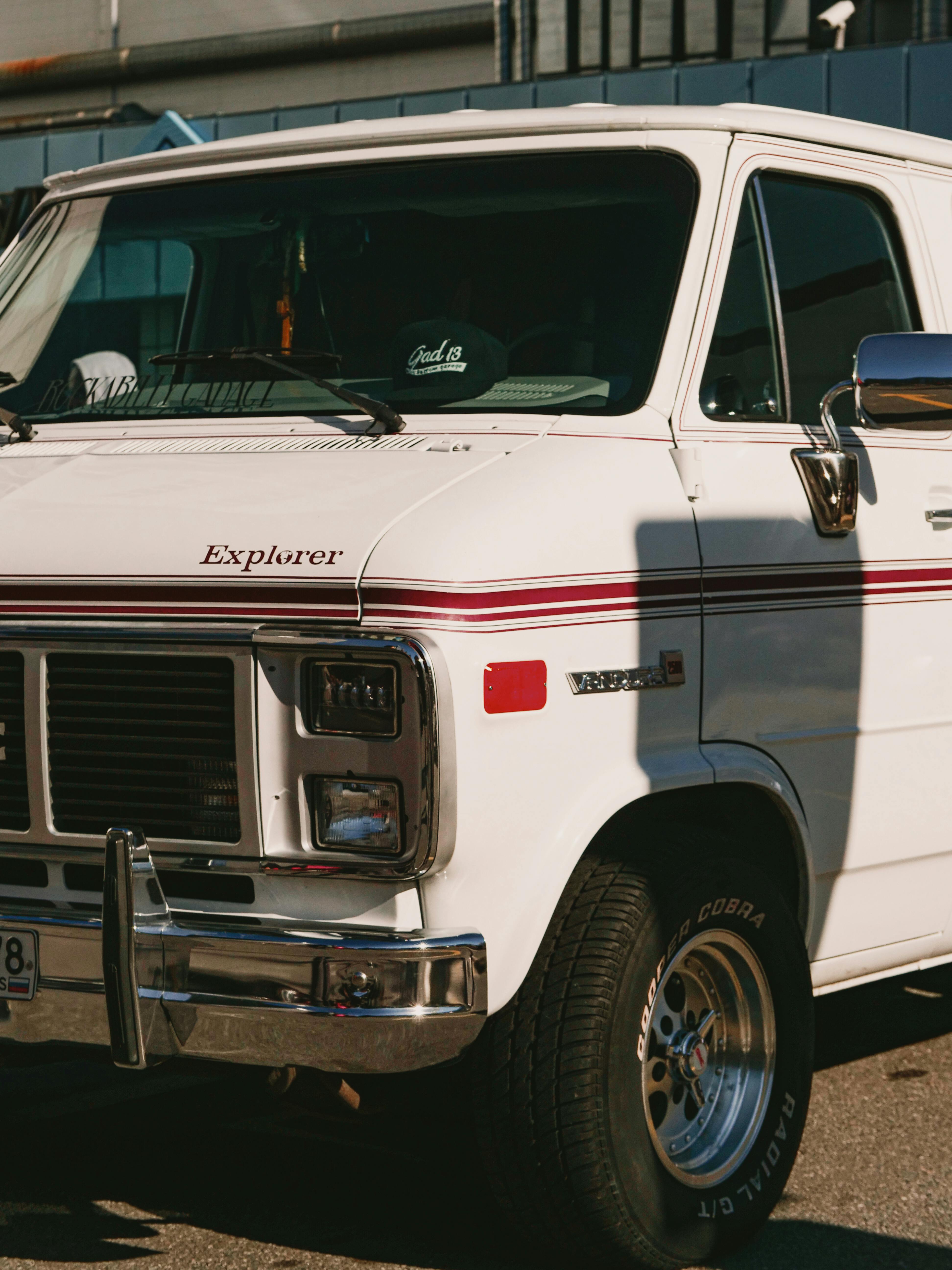 White Van Parked In Front of Beach · Free Stock Photo