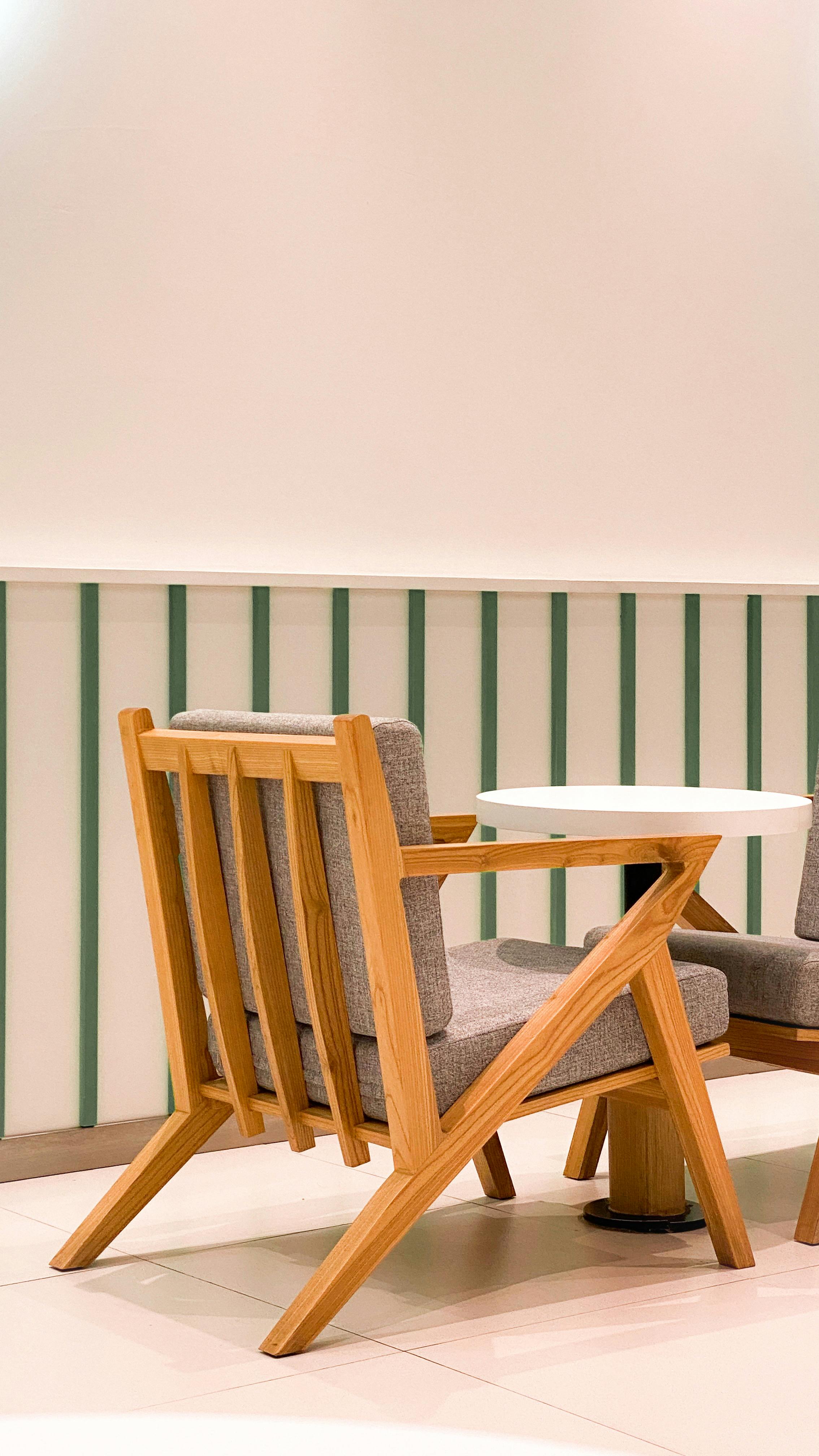 Brown Wooden Chair Beside White Table · Free Stock Photo