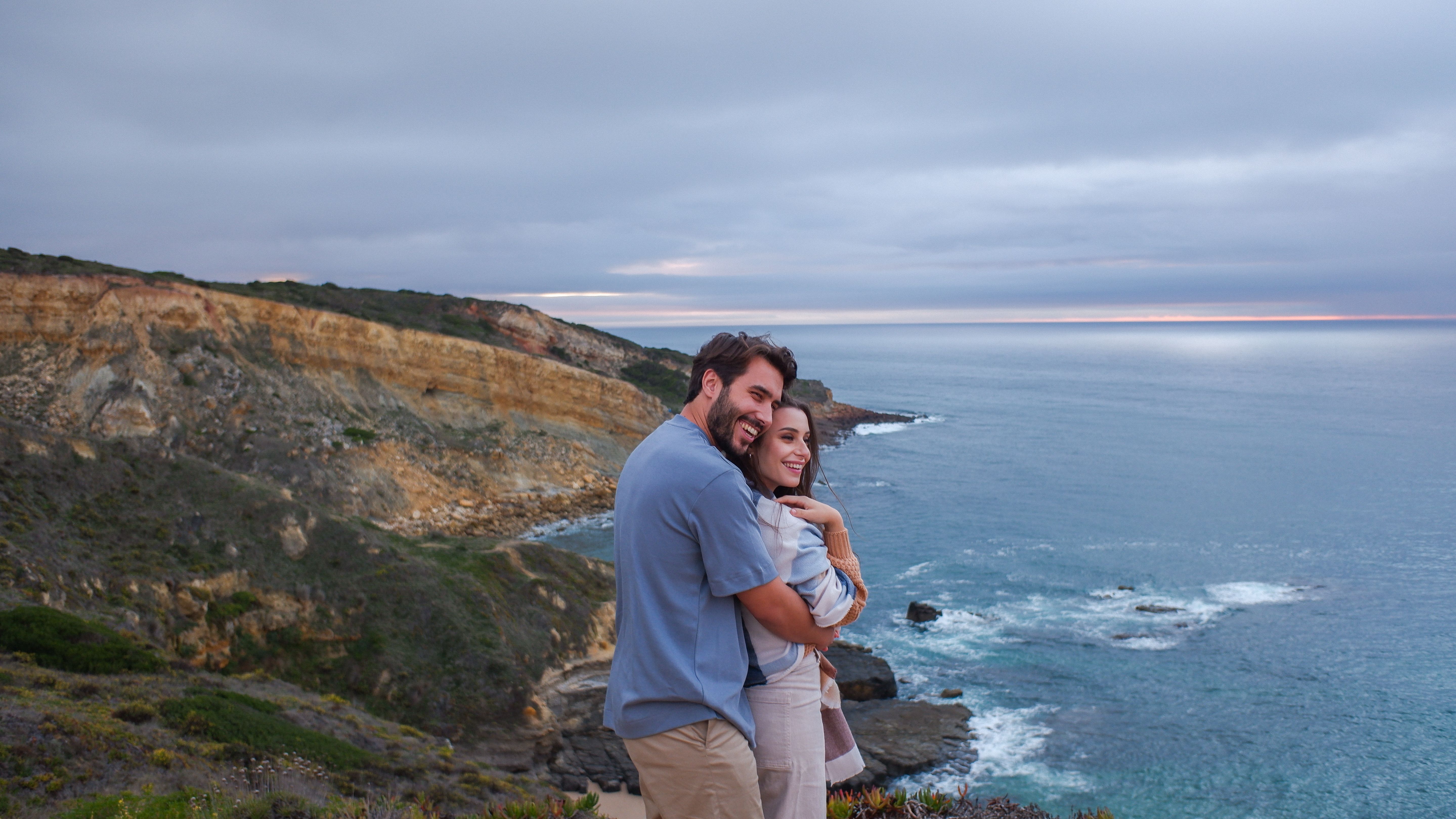 A Couple Kissing while on the Cliff · Free Stock Photo