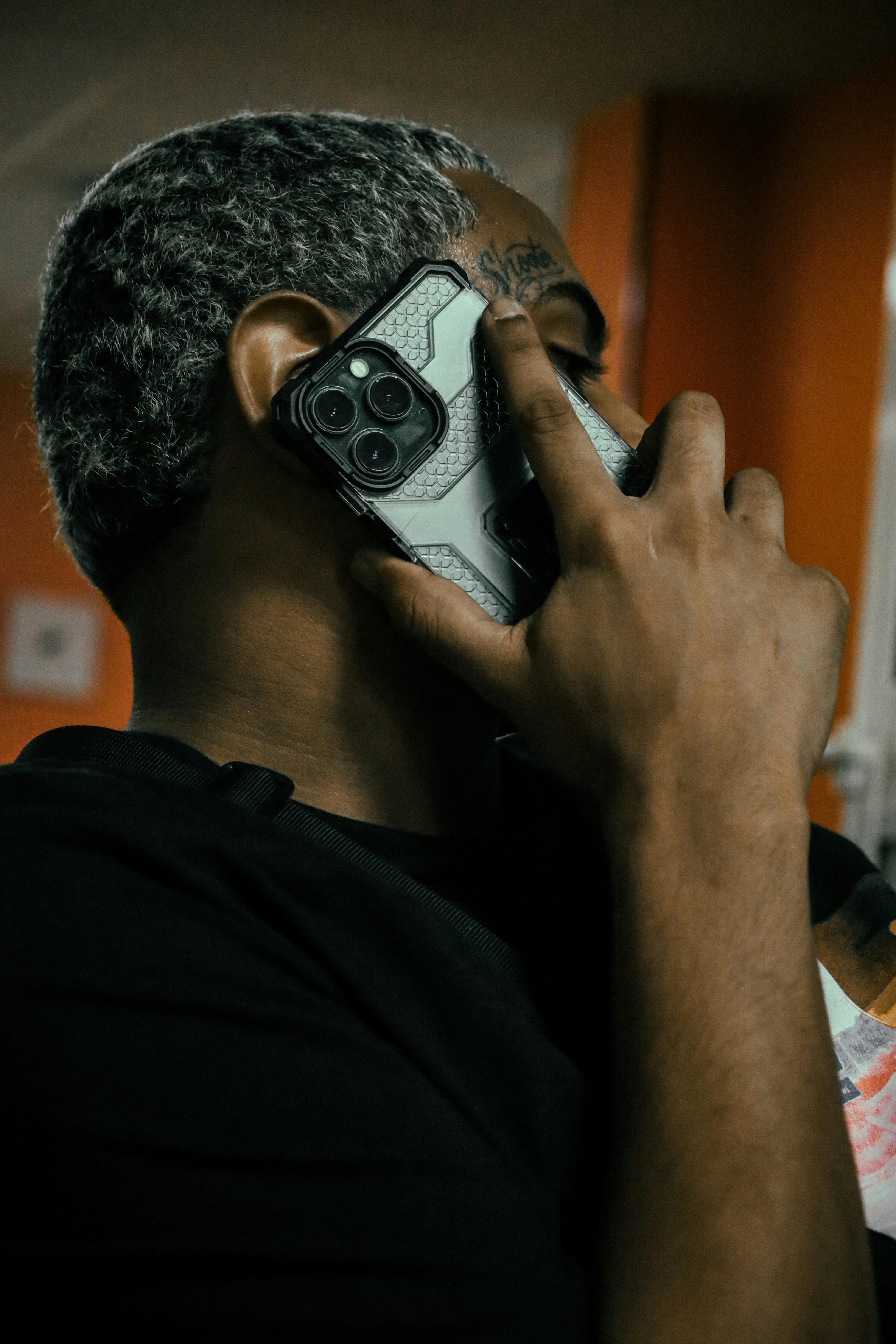 A Man using a Smartphone · Free Stock Photo