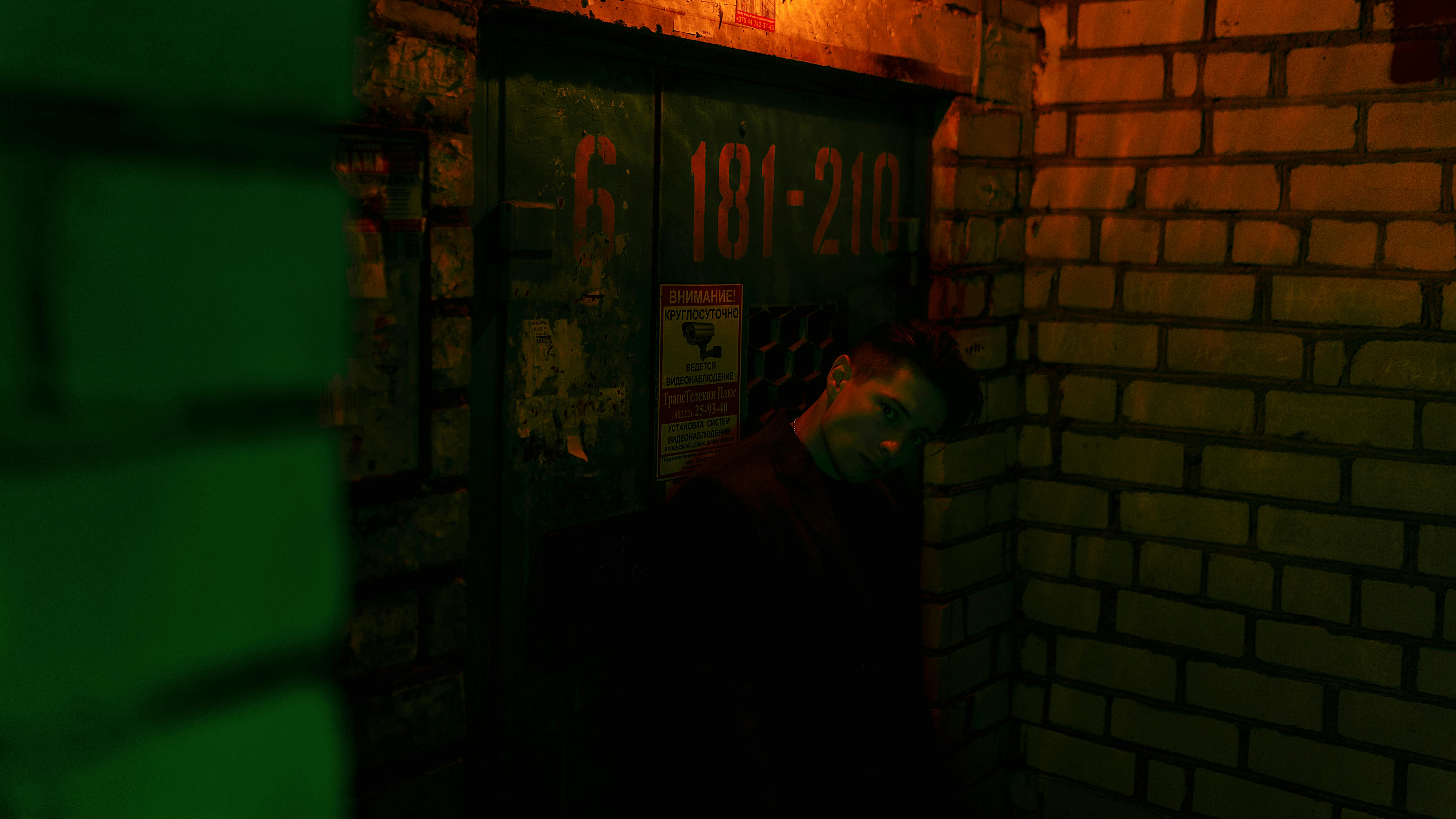 Man in Wall Corner at Night · Free Stock Photo